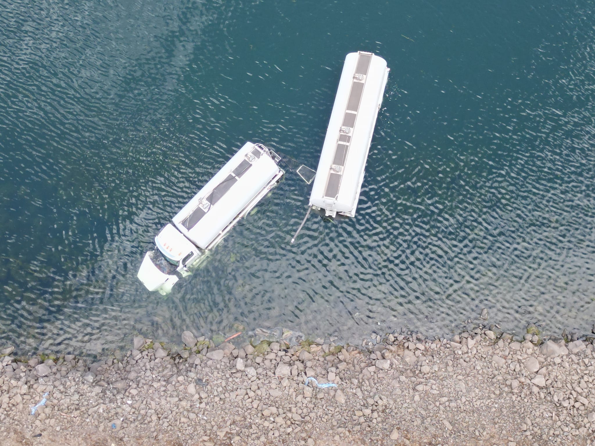 Two semi-trucks crash into Columbia River at same spot within hours ...