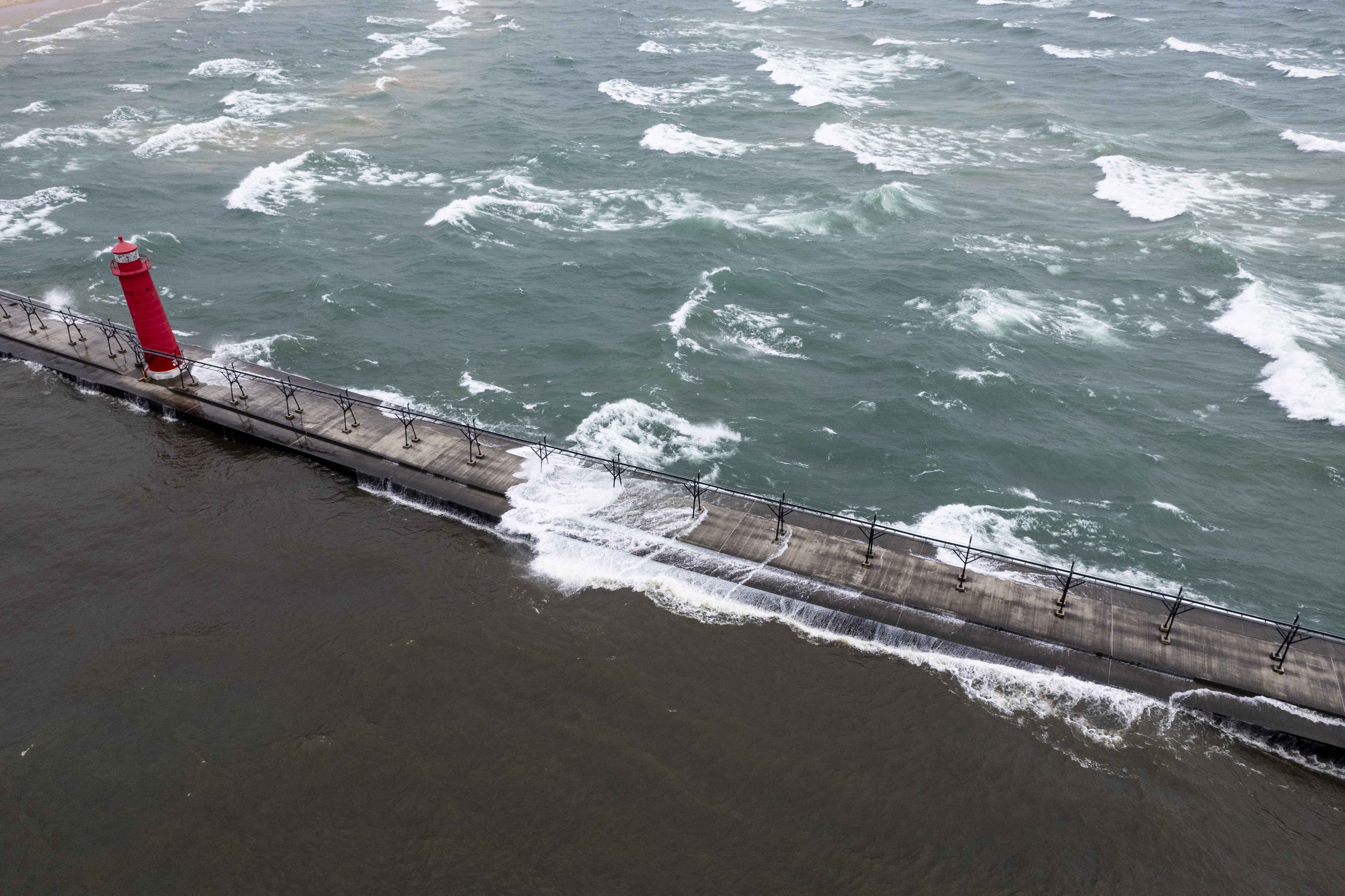 Lake Michigan waves crash into Grand Haven pier 11.6.2023 - mlive.com
