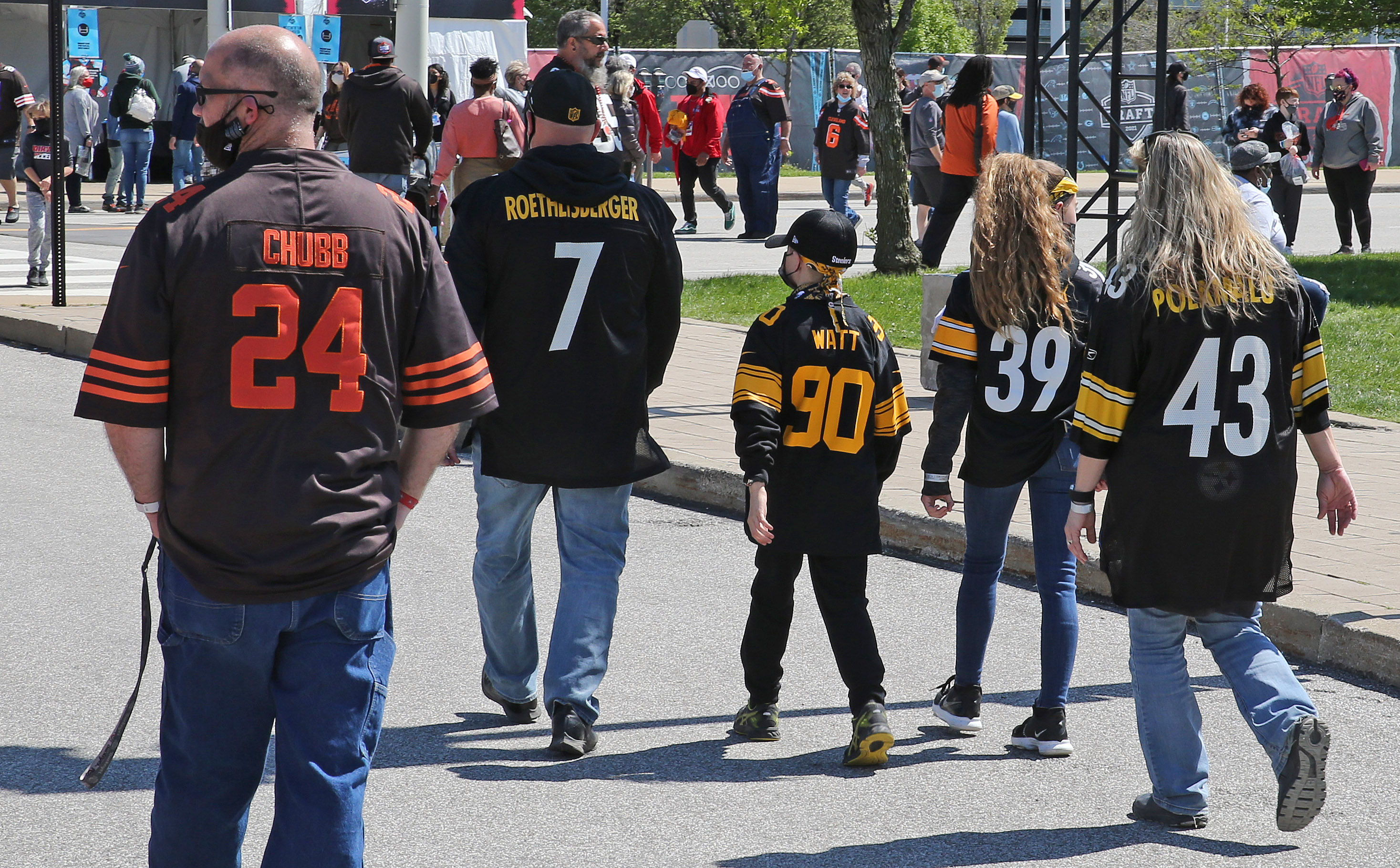 NFL jerseys and team costumes seen in downtown Cleveland during the ...