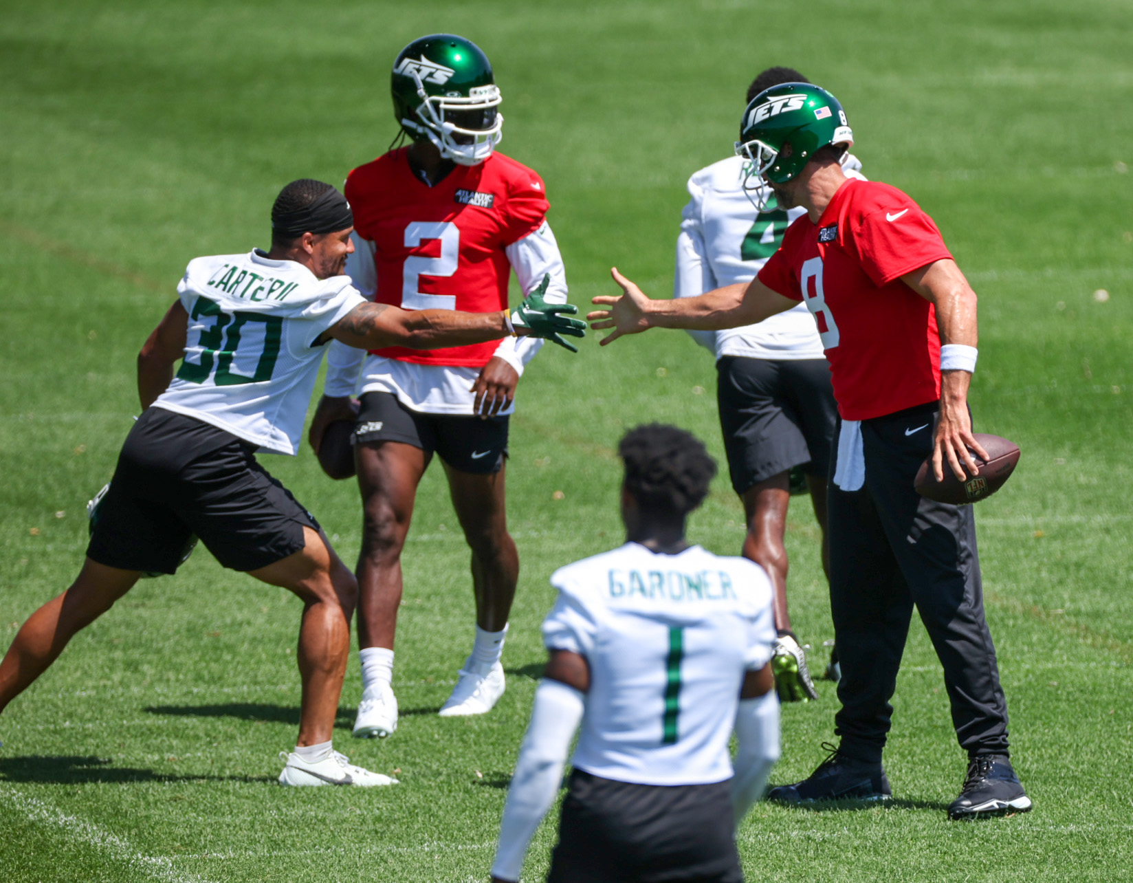 Quarterback Aaron Rodgers practices at New York Jets OTAs - nj.com