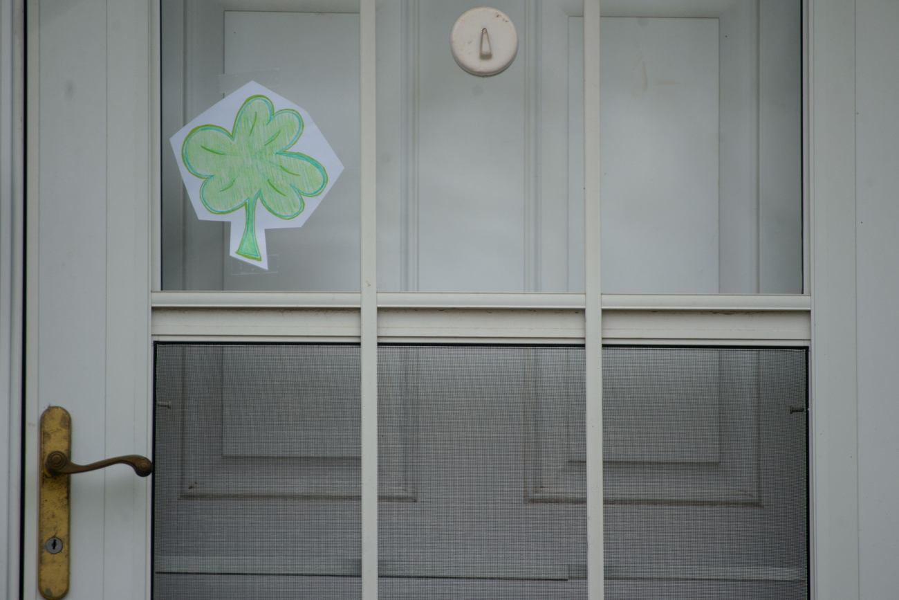 Ann Arbor neighborhoods use window displays to connect while practicing ...