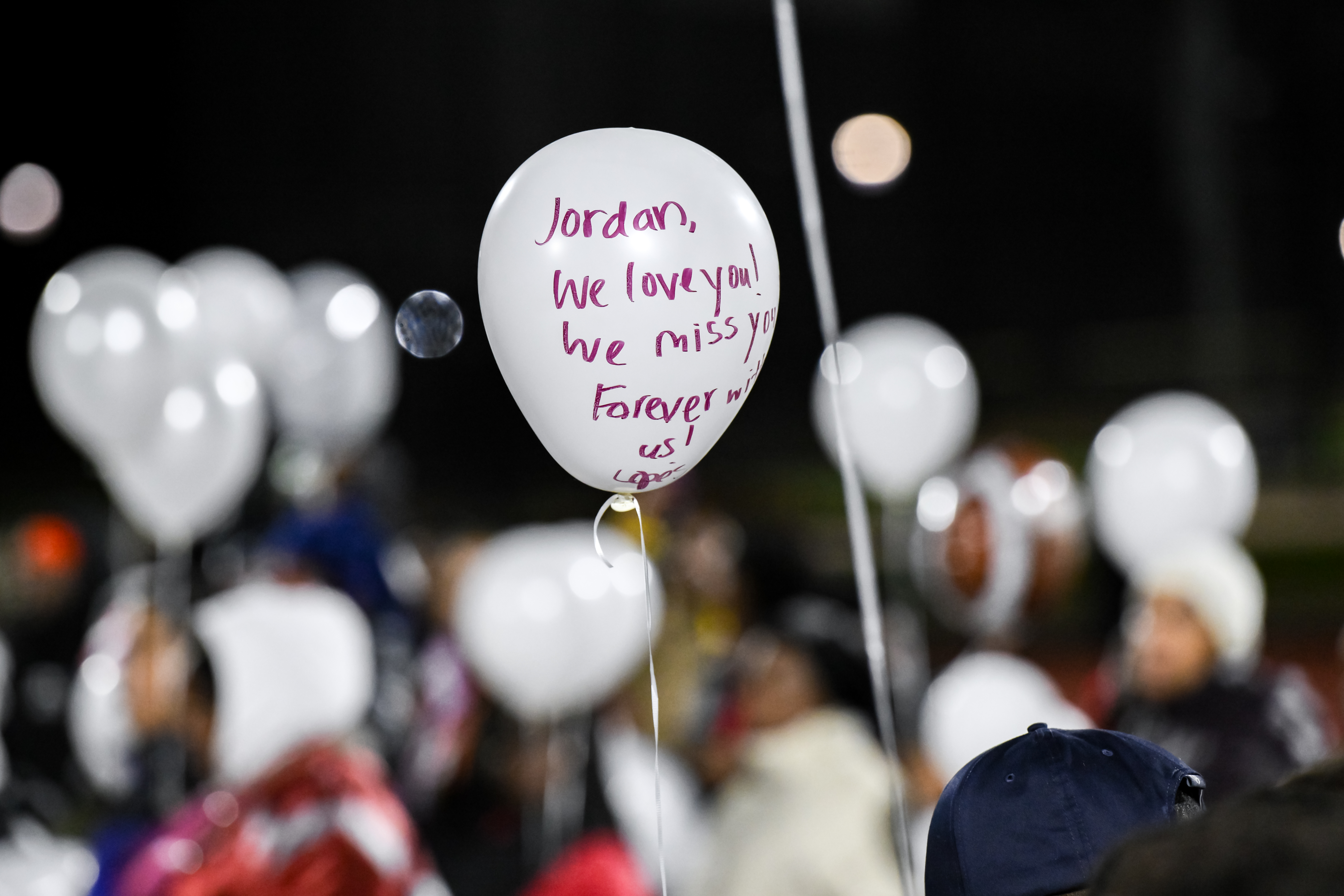 Community honors Newark shooting victims with a balloon release ...