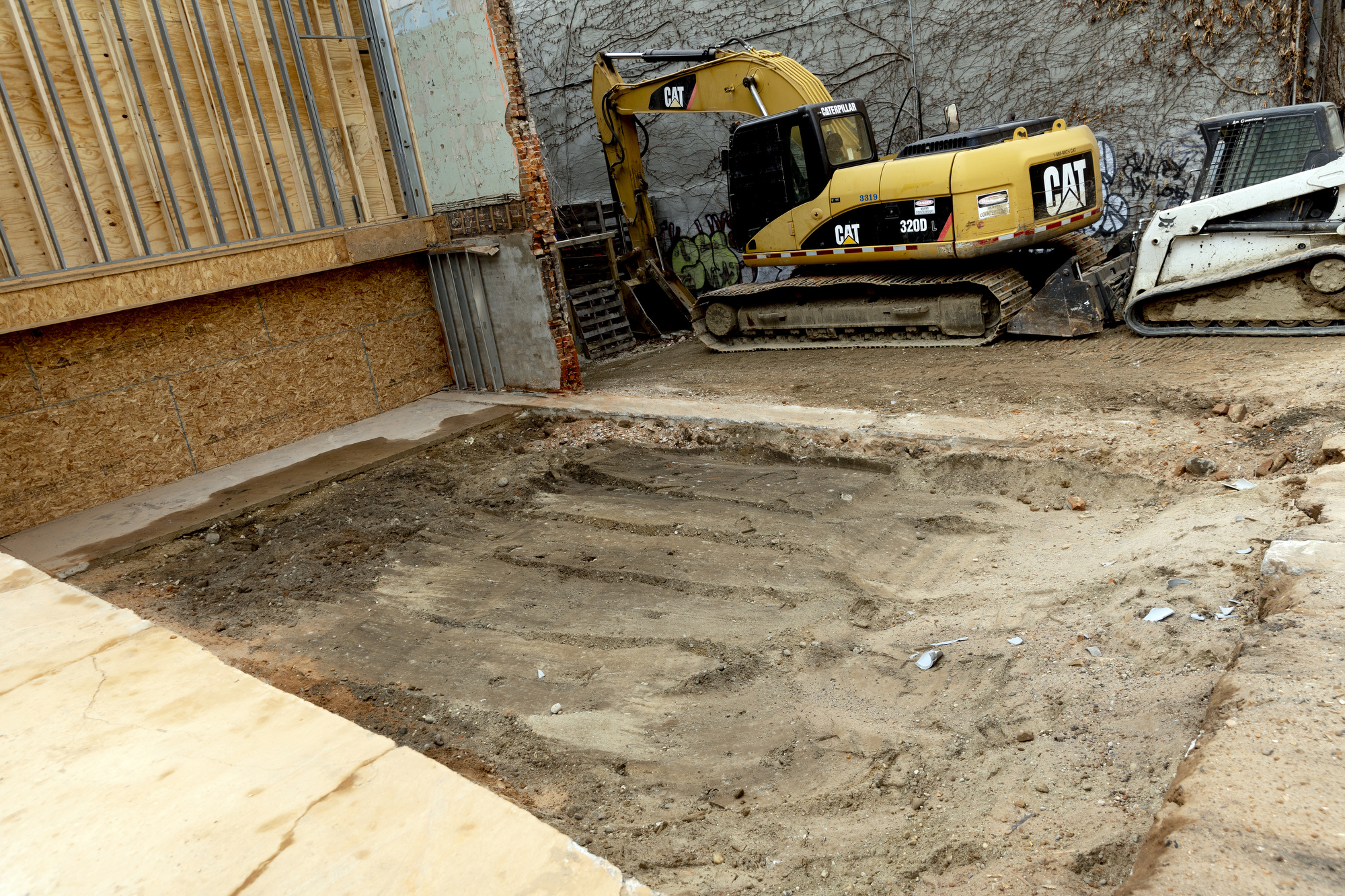 Downtown Flint building partially demolished in Brush Alley - mlive.com