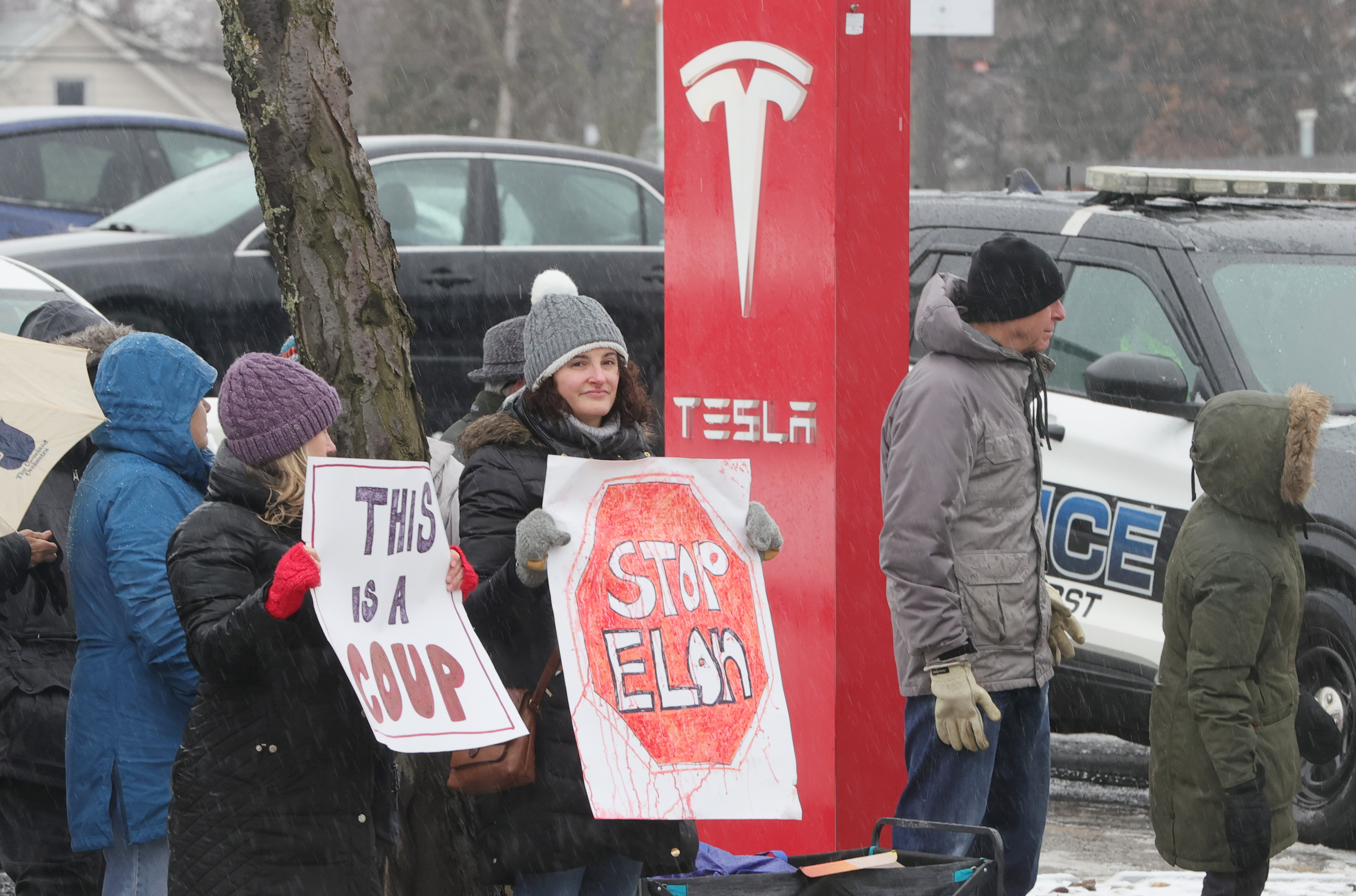 Rally at Tesla Motors Cleveland in Lyndhurst in protest of Elon Musk’s ...