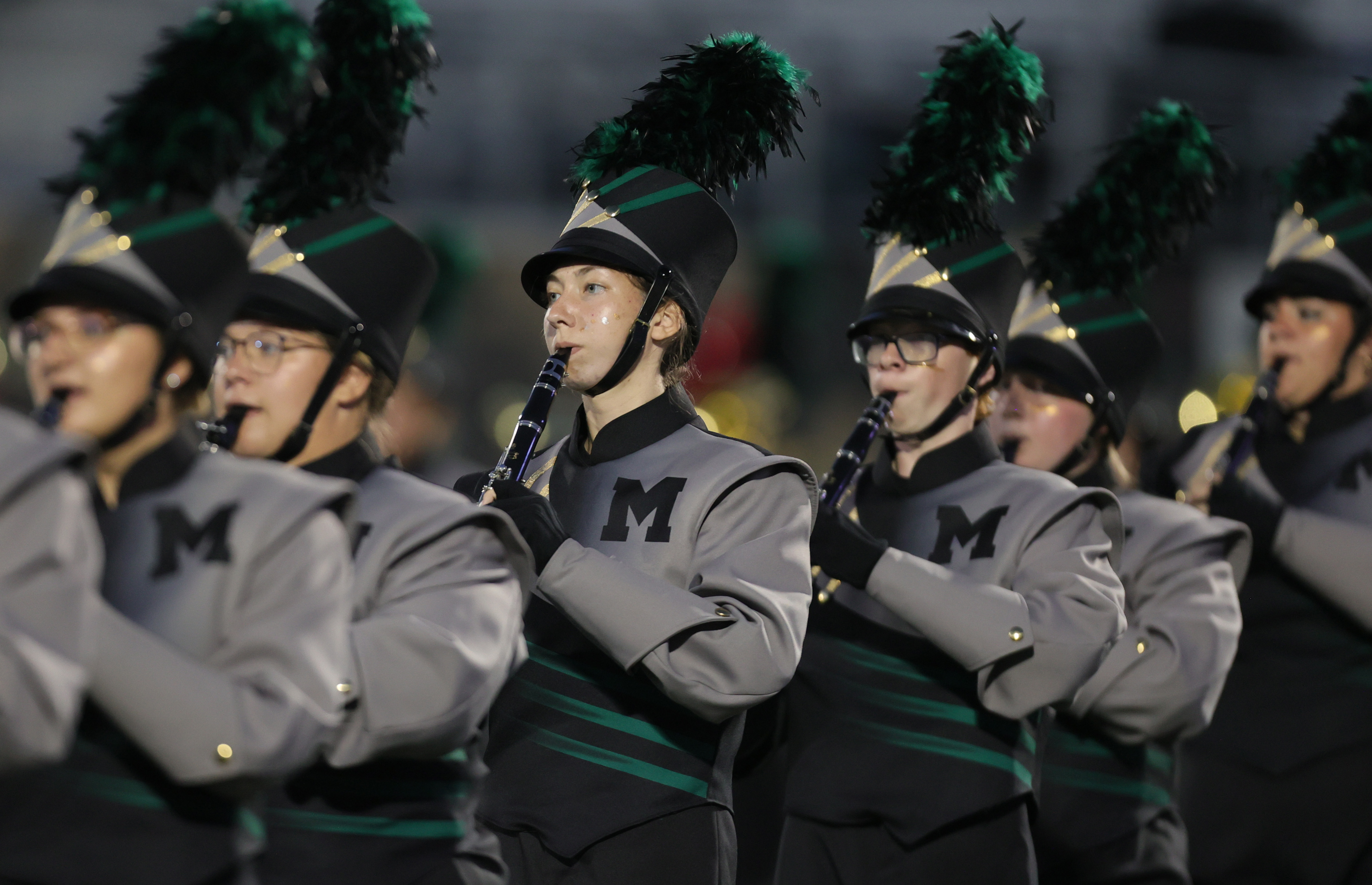 Medina High School marching band performs during their game against ...