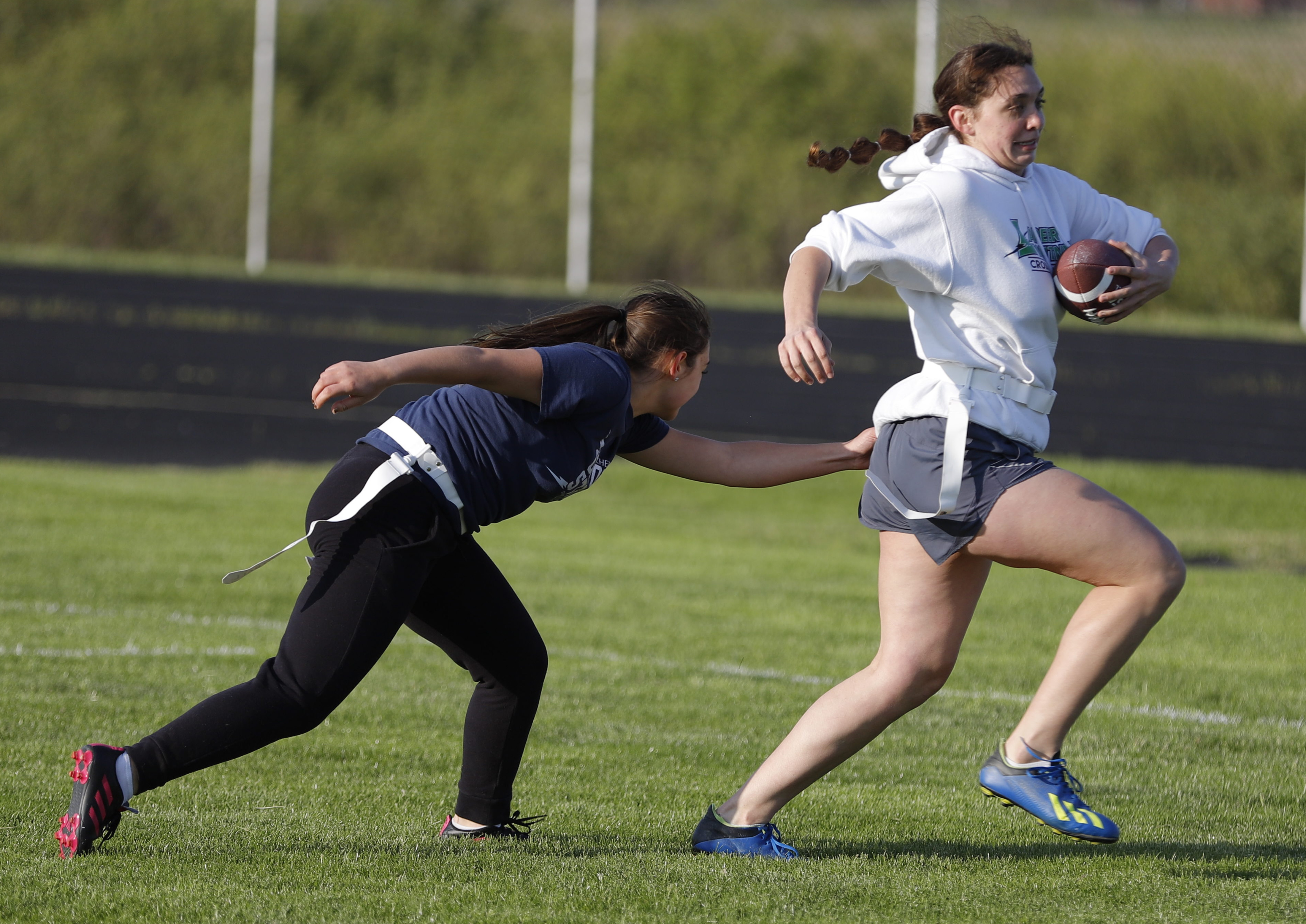 Lapeer high school girls participate in flag football pilot league ...