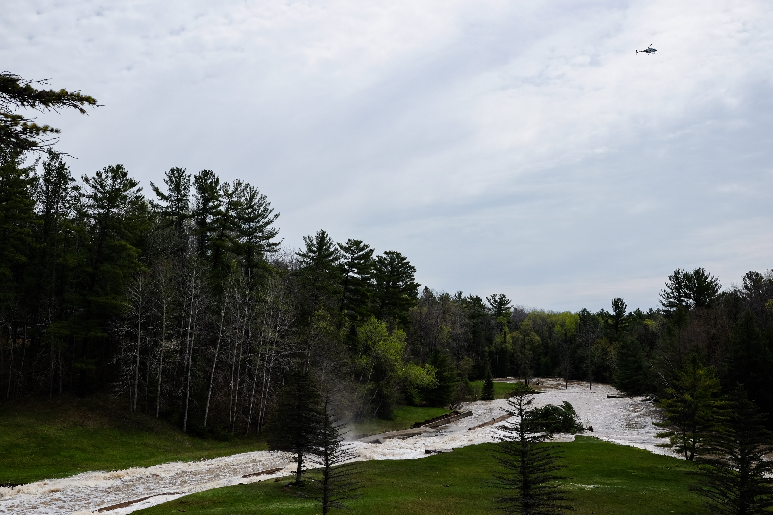 Heavy rains cause Forest Lake dam spillway to overflow - mlive.com