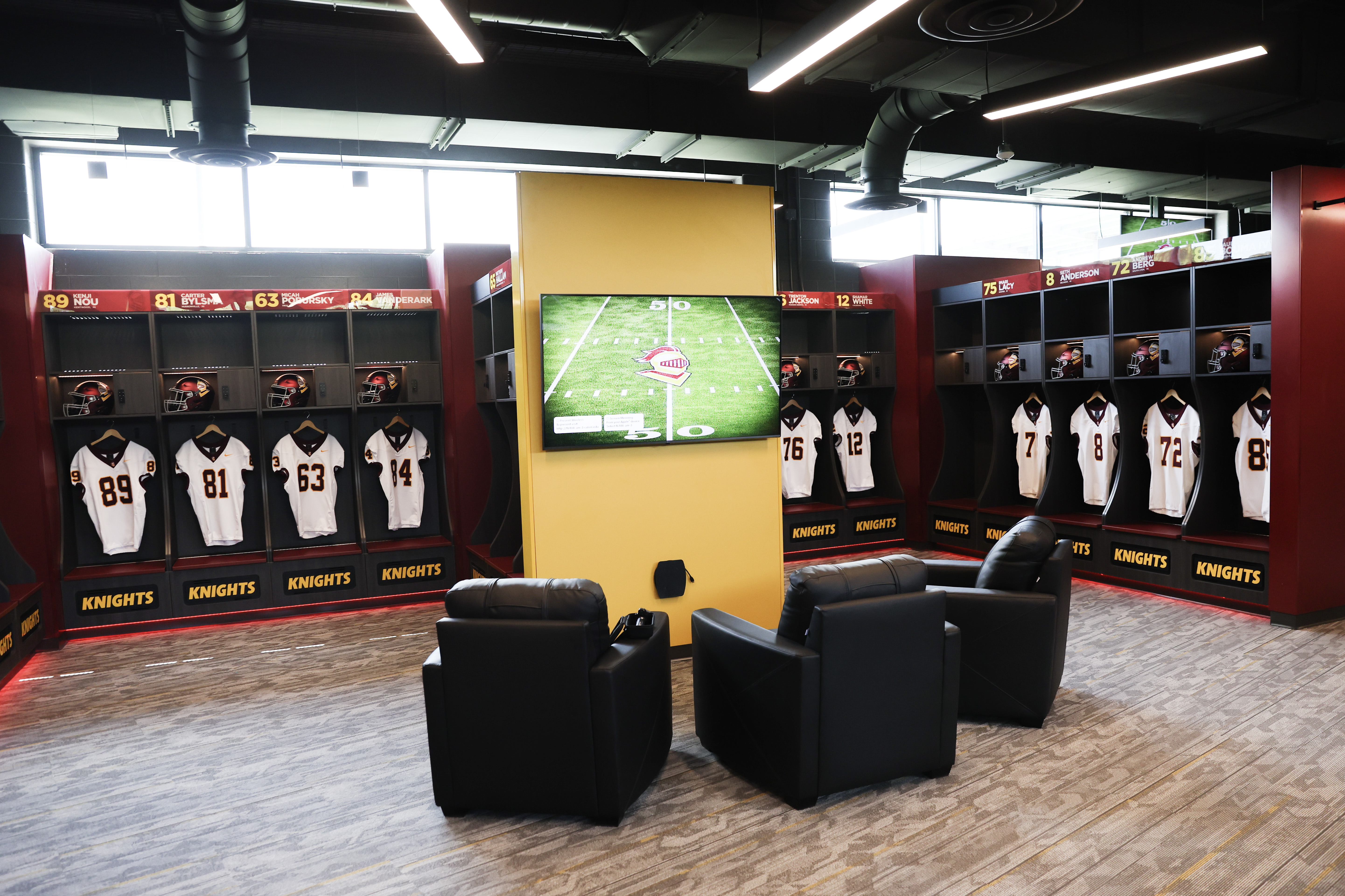 Calvin football players see their newly built locker room for the first ...