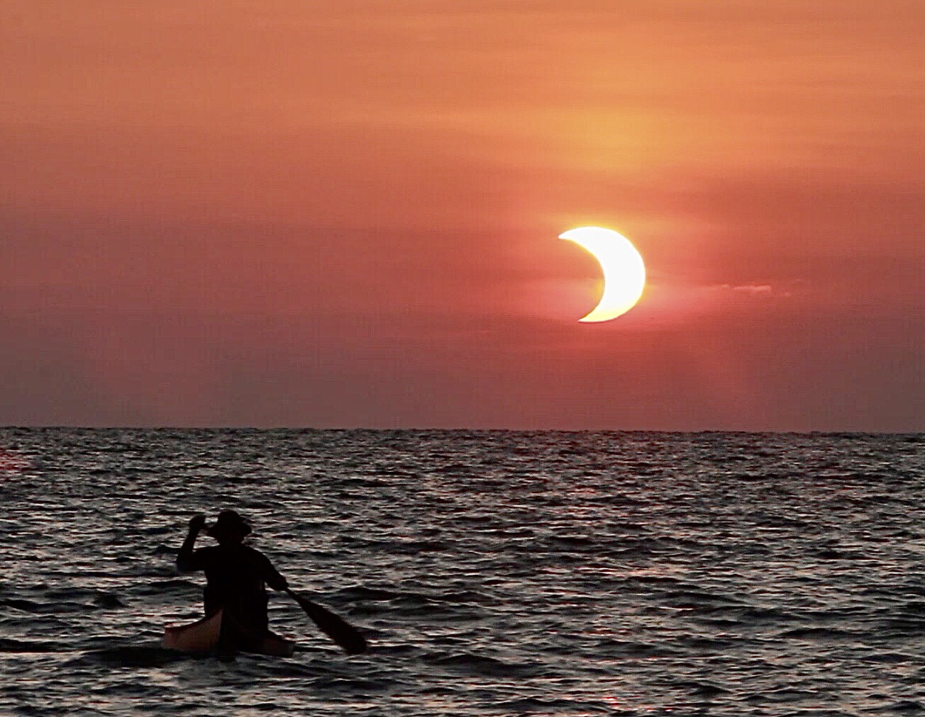 Sunrise solar eclipse over Lake Huron - mlive.com