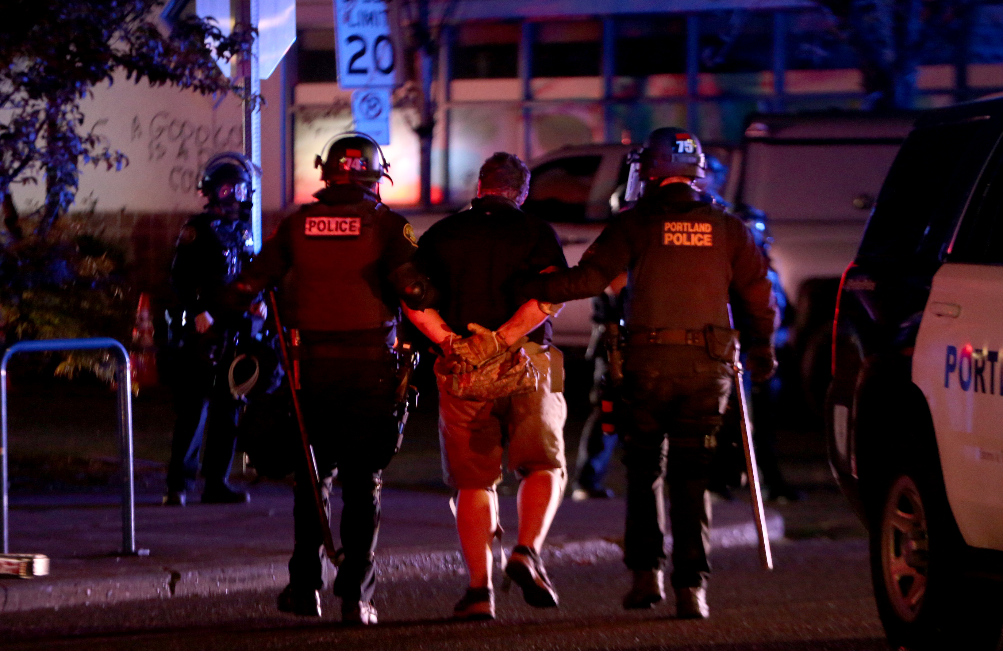 Riot declared as fire set outside Portland police union headquarters ...