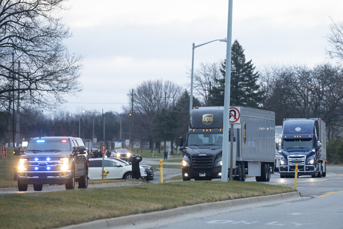 Trucks carrying COVID-19 vaccine depart Pfizer plant in Portage ...