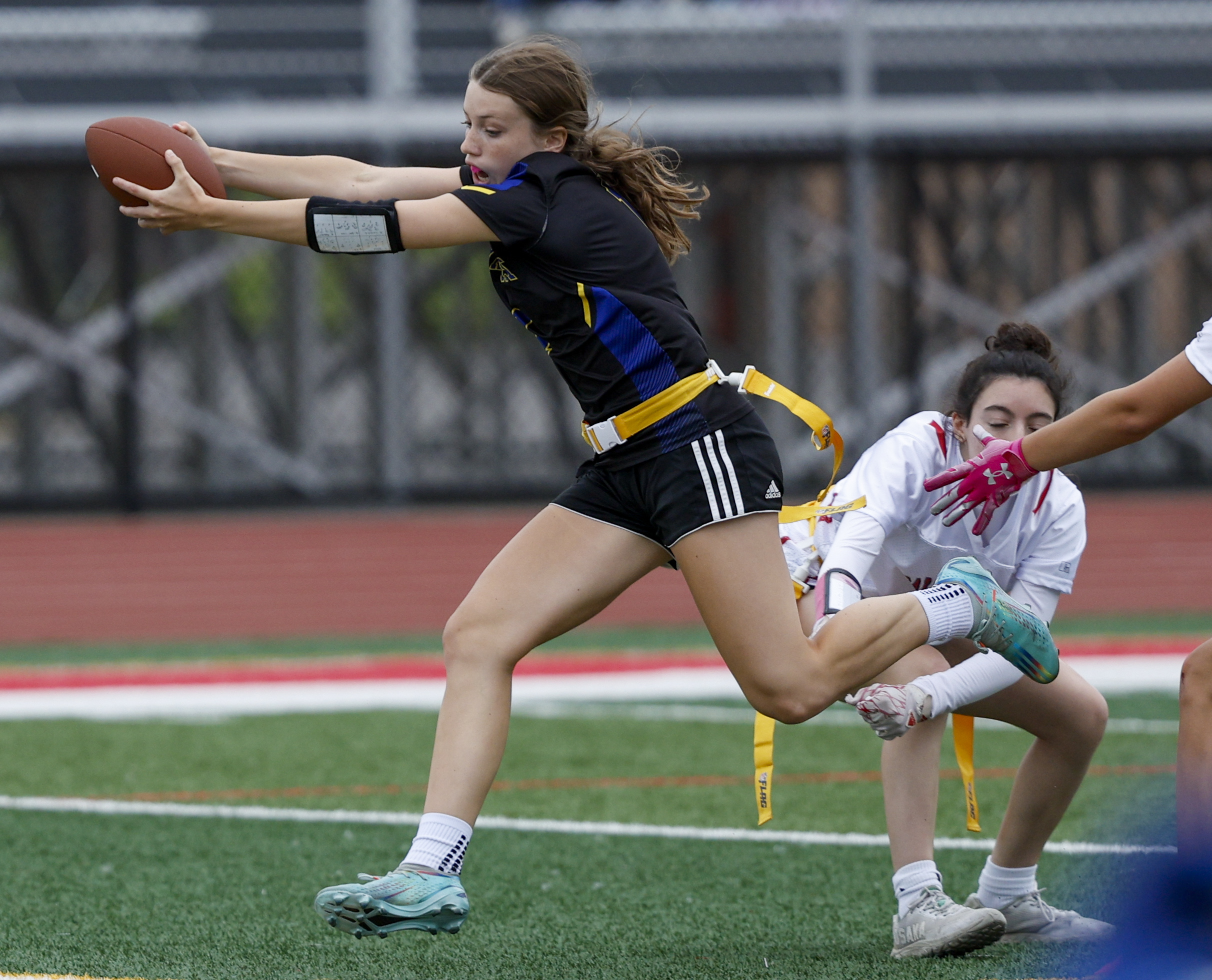 The North defeats the South in a CNY girls high school flag football ...