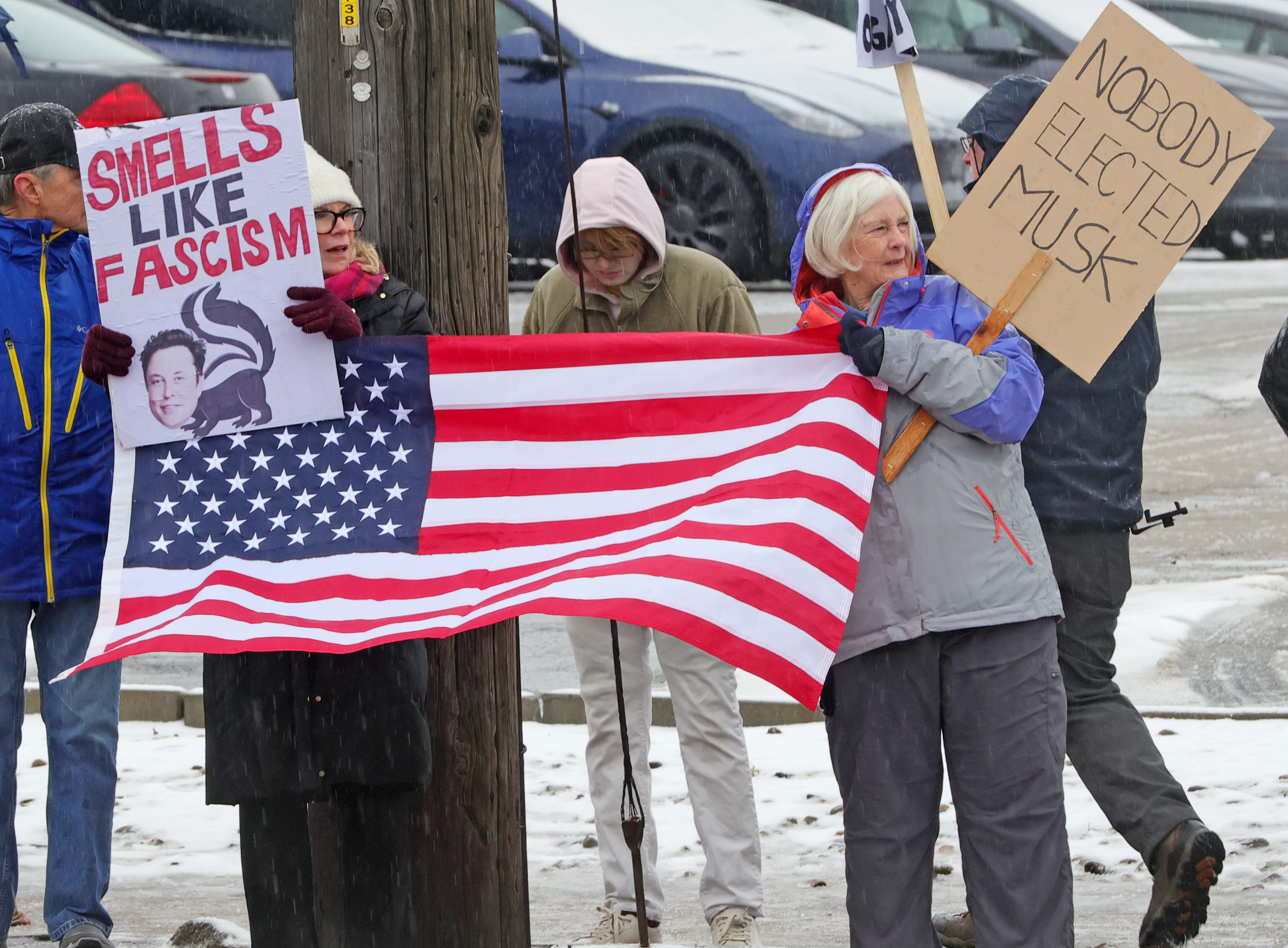Rally at Tesla Motors Cleveland in Lyndhurst in protest of Elon Musk’s ...