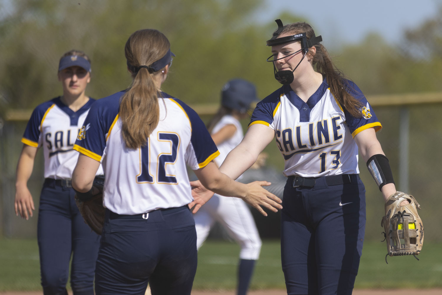 See photos as Saline hosts Dexter, Chelsea in baseball and softball ...