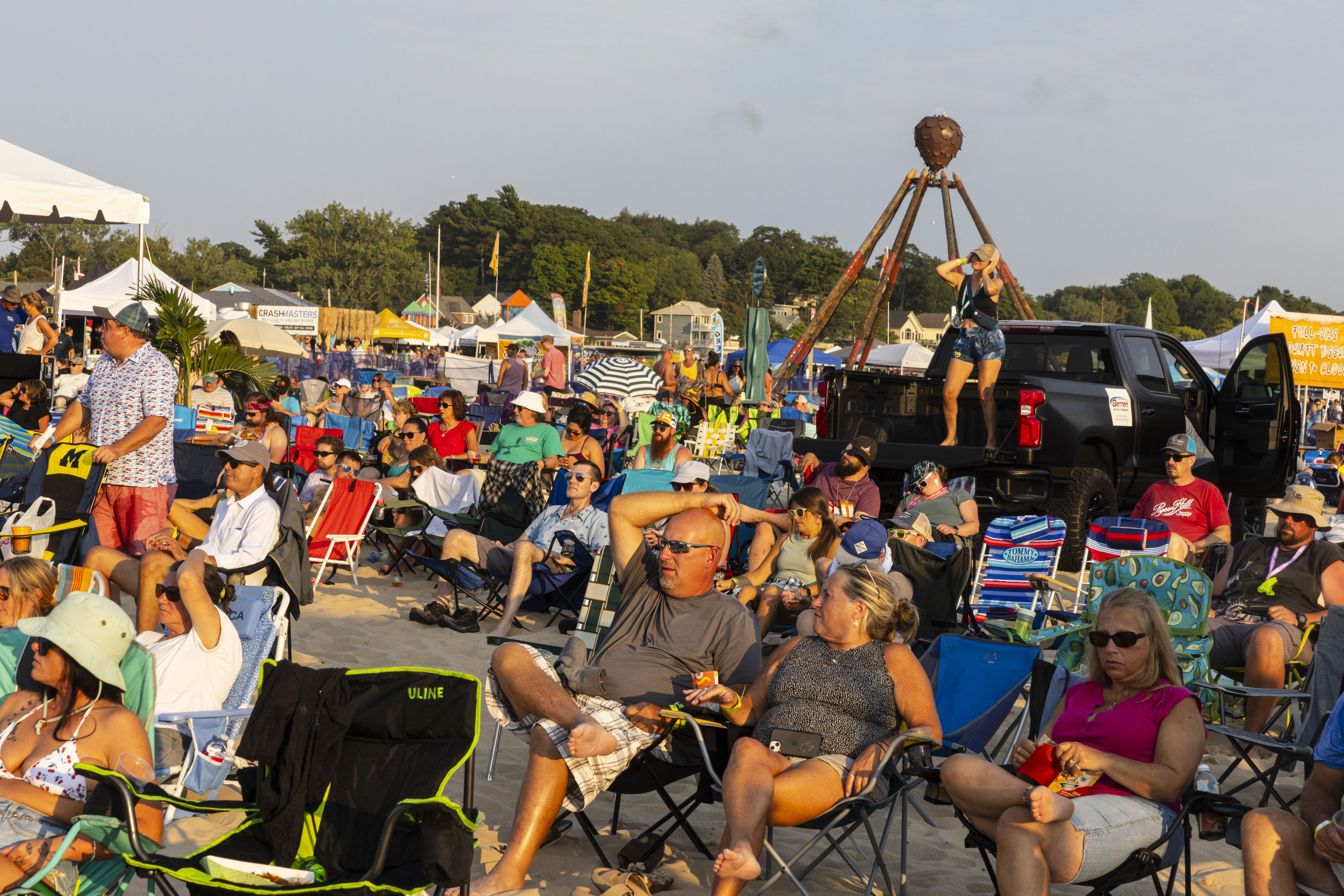 Thousands pack Lake Michigan beach for Burning Foot Beer Festival 2024 ...