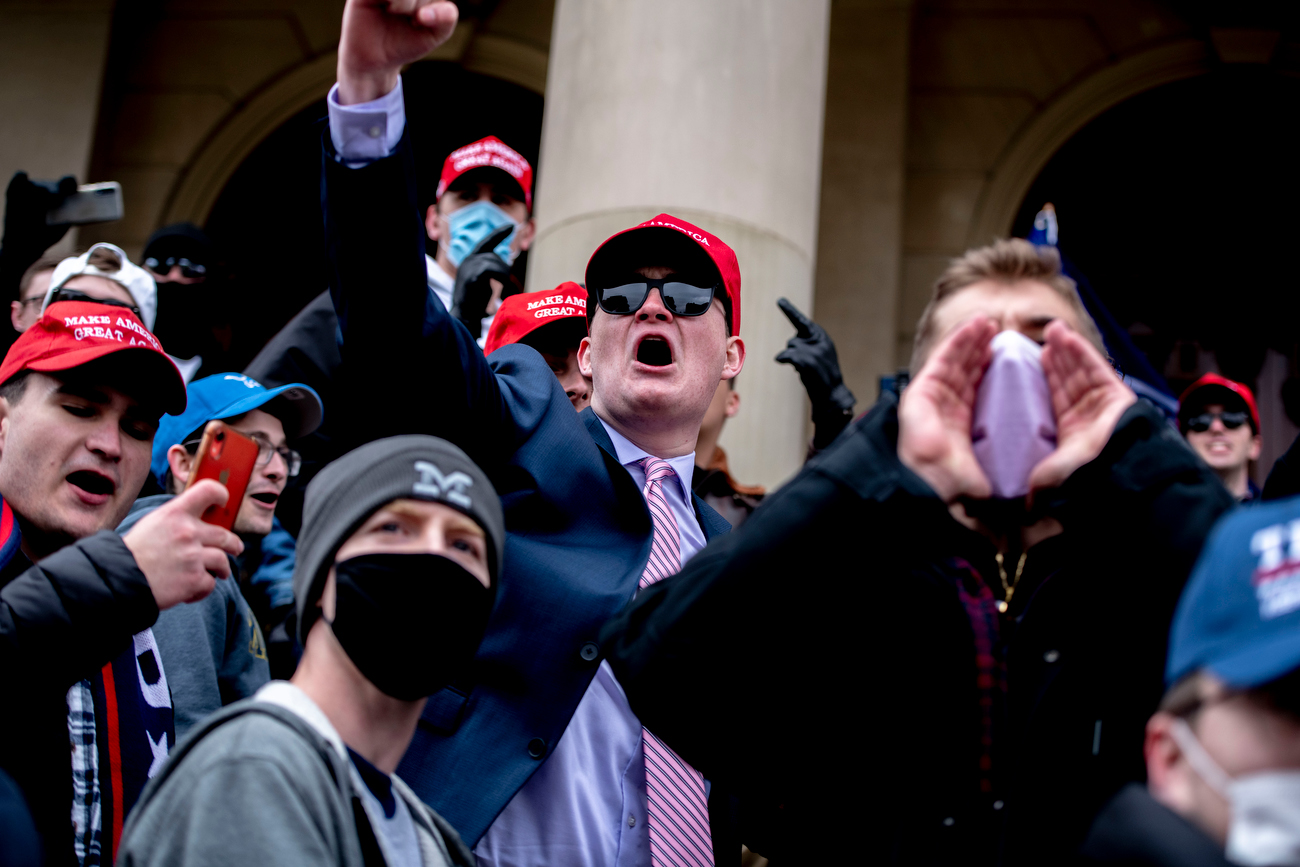 Far right activists rally at Michigan State Capitol Building on ...