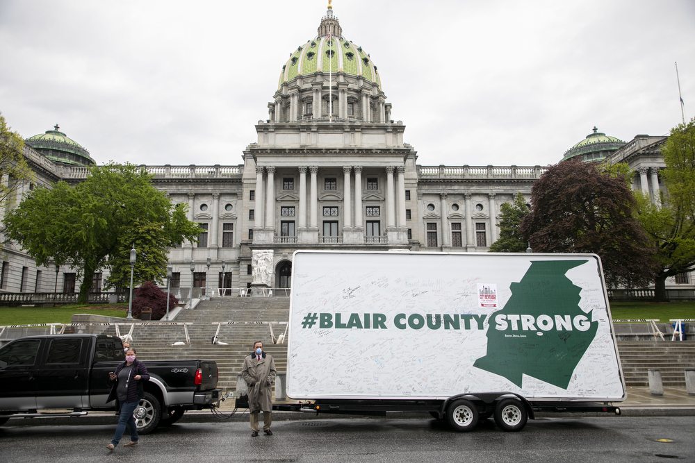Billboard displayed at Capitol to try and end stay-at-home order during ...