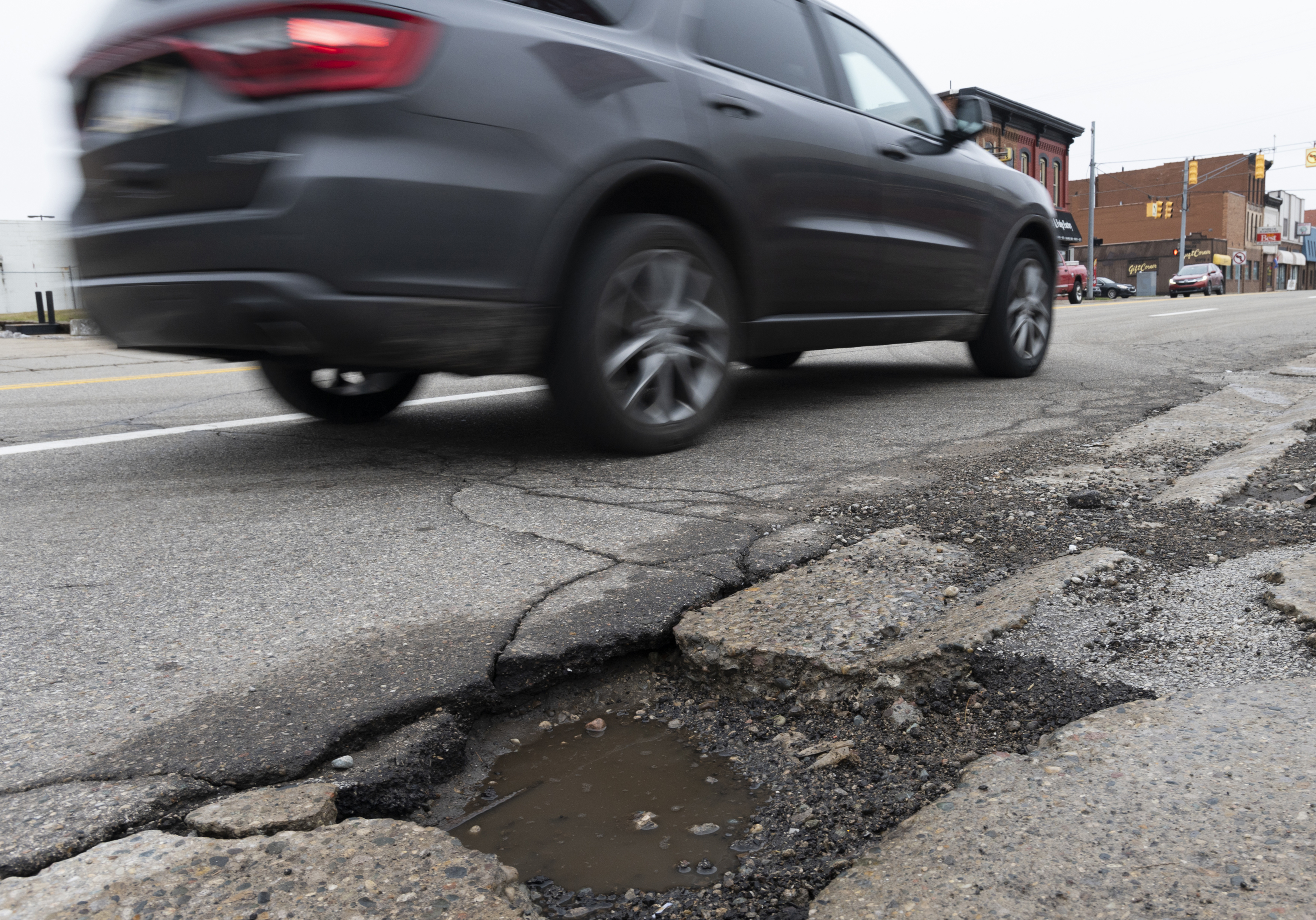 Potholes emerge around Jackson - mlive.com