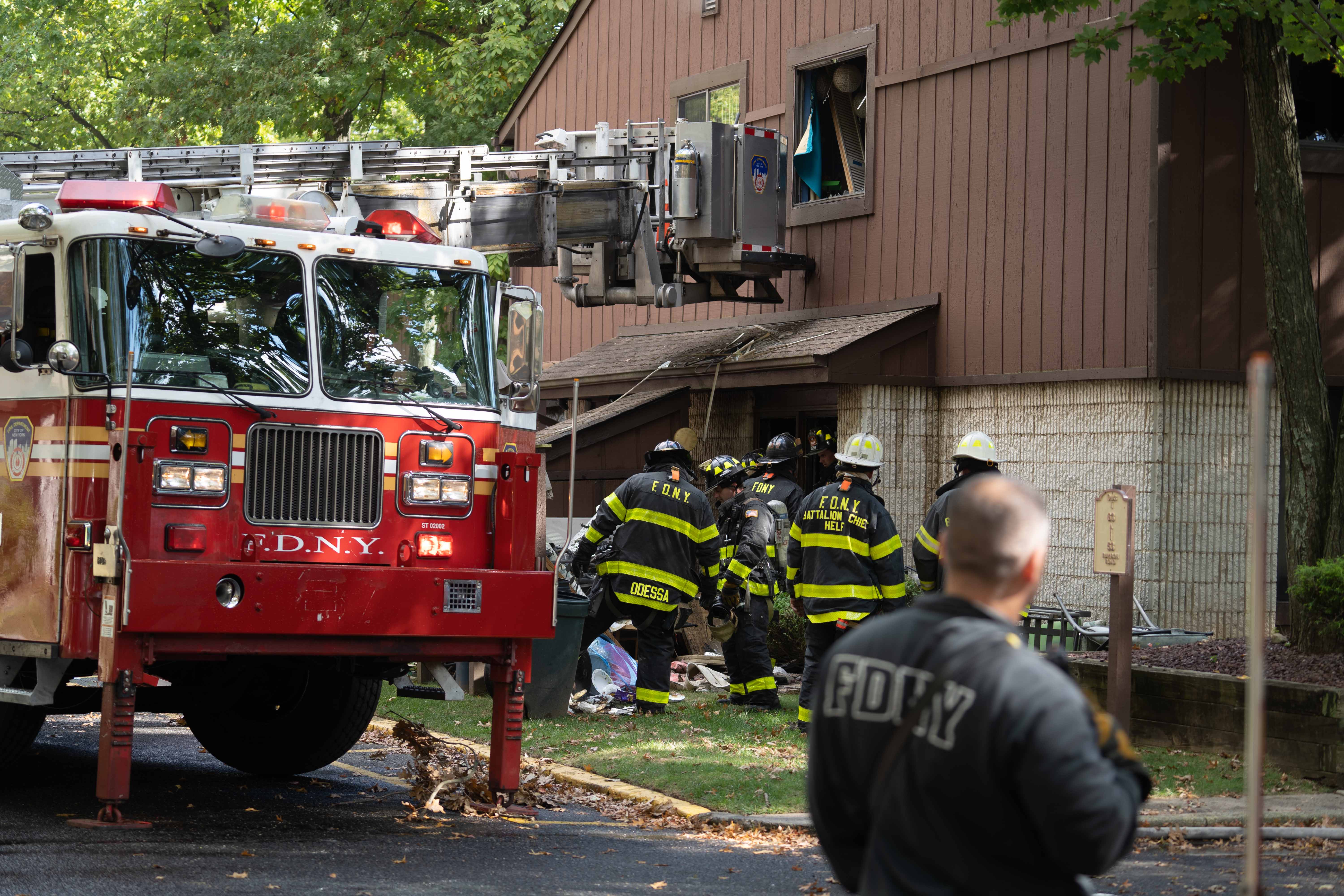 Blaze in New Springville townhouses leaves two firefighters injured ...