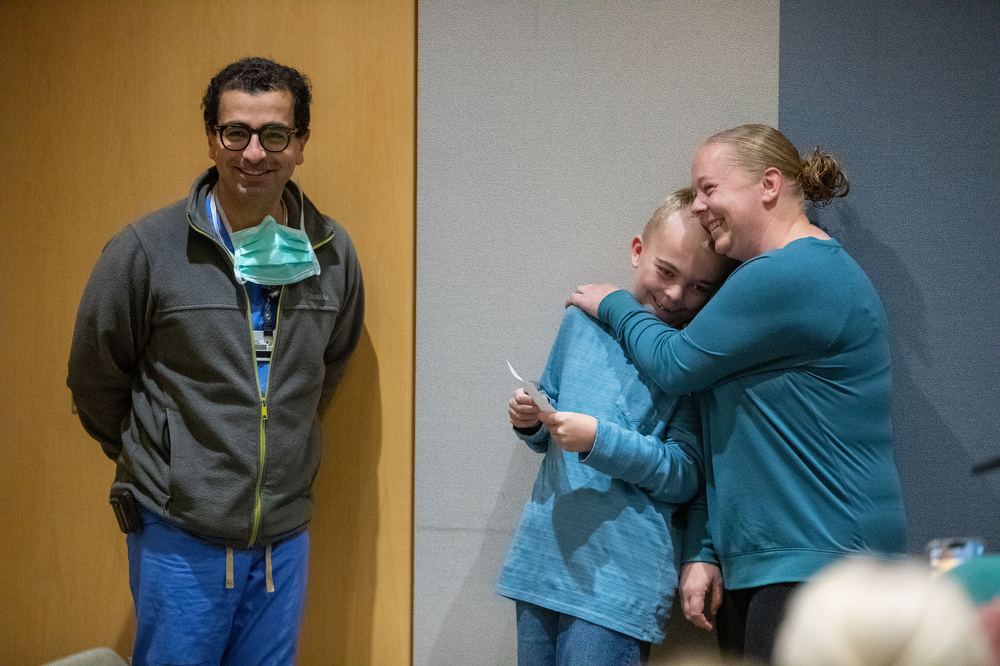 Family presents Hershey doctor with $23K after he saved the life of ...