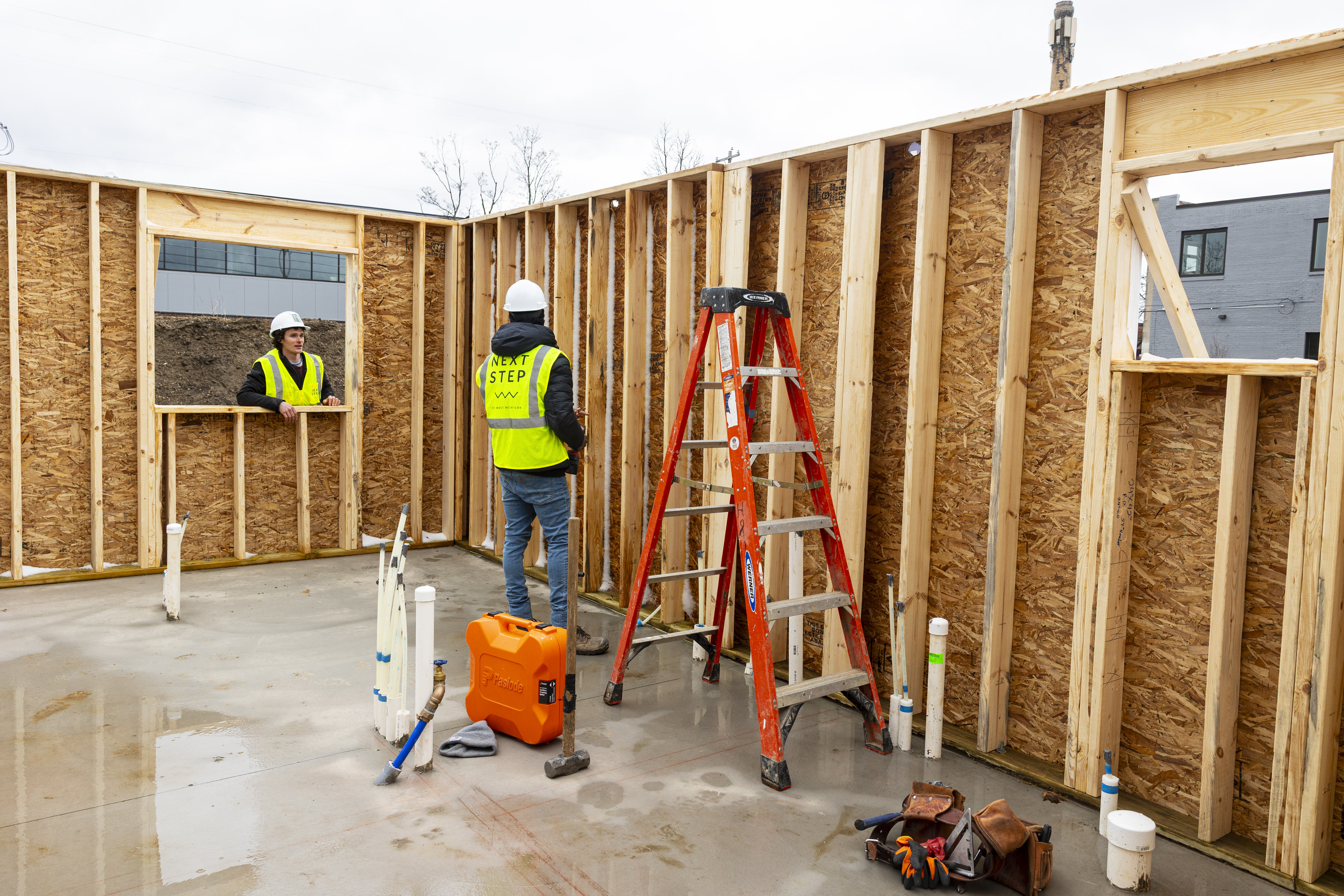 Mel Trotter Ministries holds wall raising ceremony for Hope Village in ...