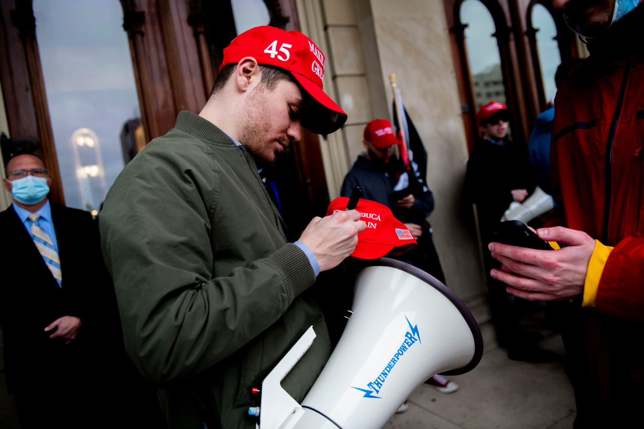 Far right activists rally at Michigan State Capitol Building on ...