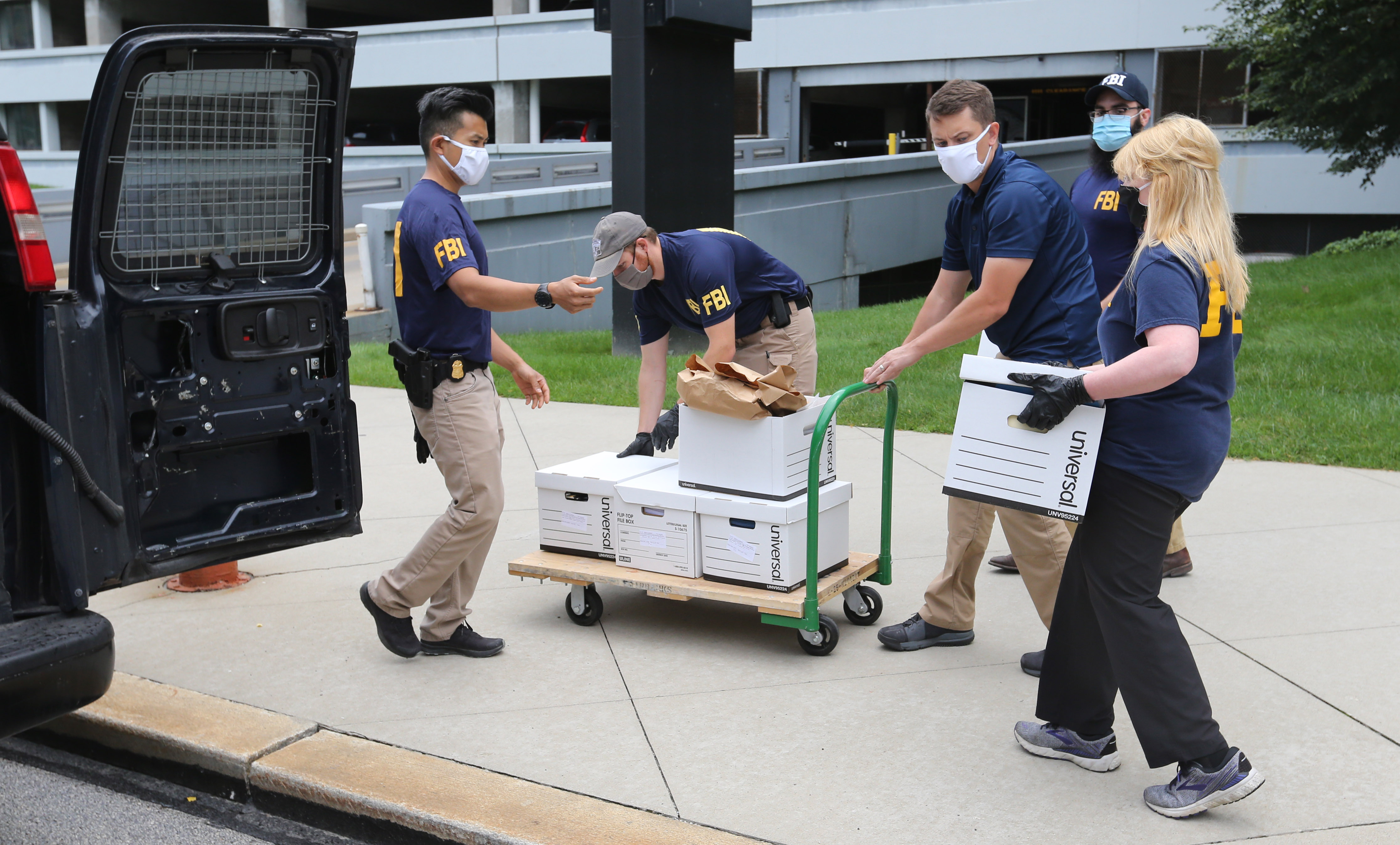 FBI raids the Cleveland offices of Optima Management Group with ties to ...