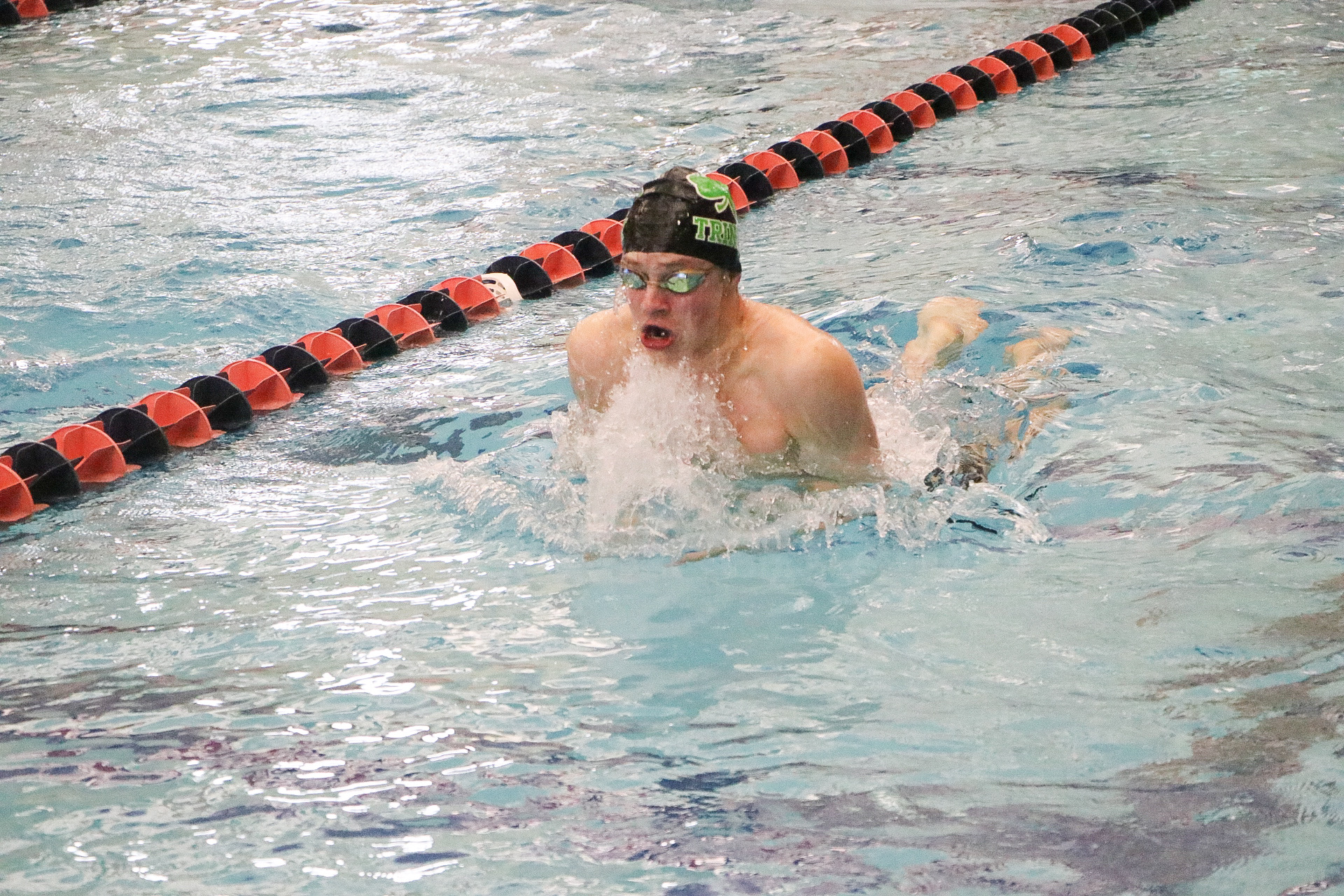 Trinity's boys team competes in the 200 medley relay during the PIAA ...