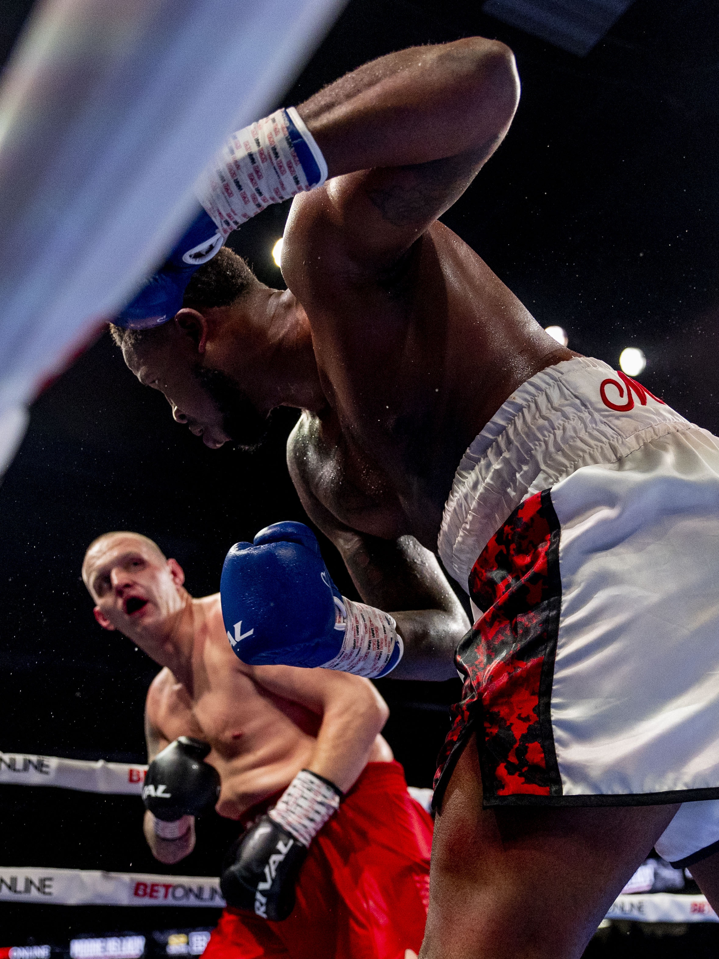 Boxers fly out of the ring and into crowd in WWE style at Michigan bout ...