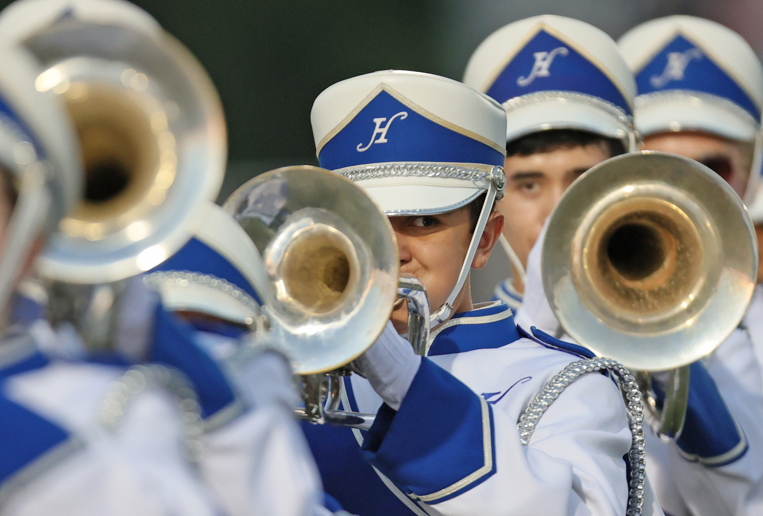 Hudson High School's marching band performs in their season home ...
