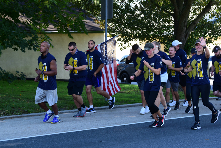 Warren County police hit the streets in Torch Run to benefit Special ...