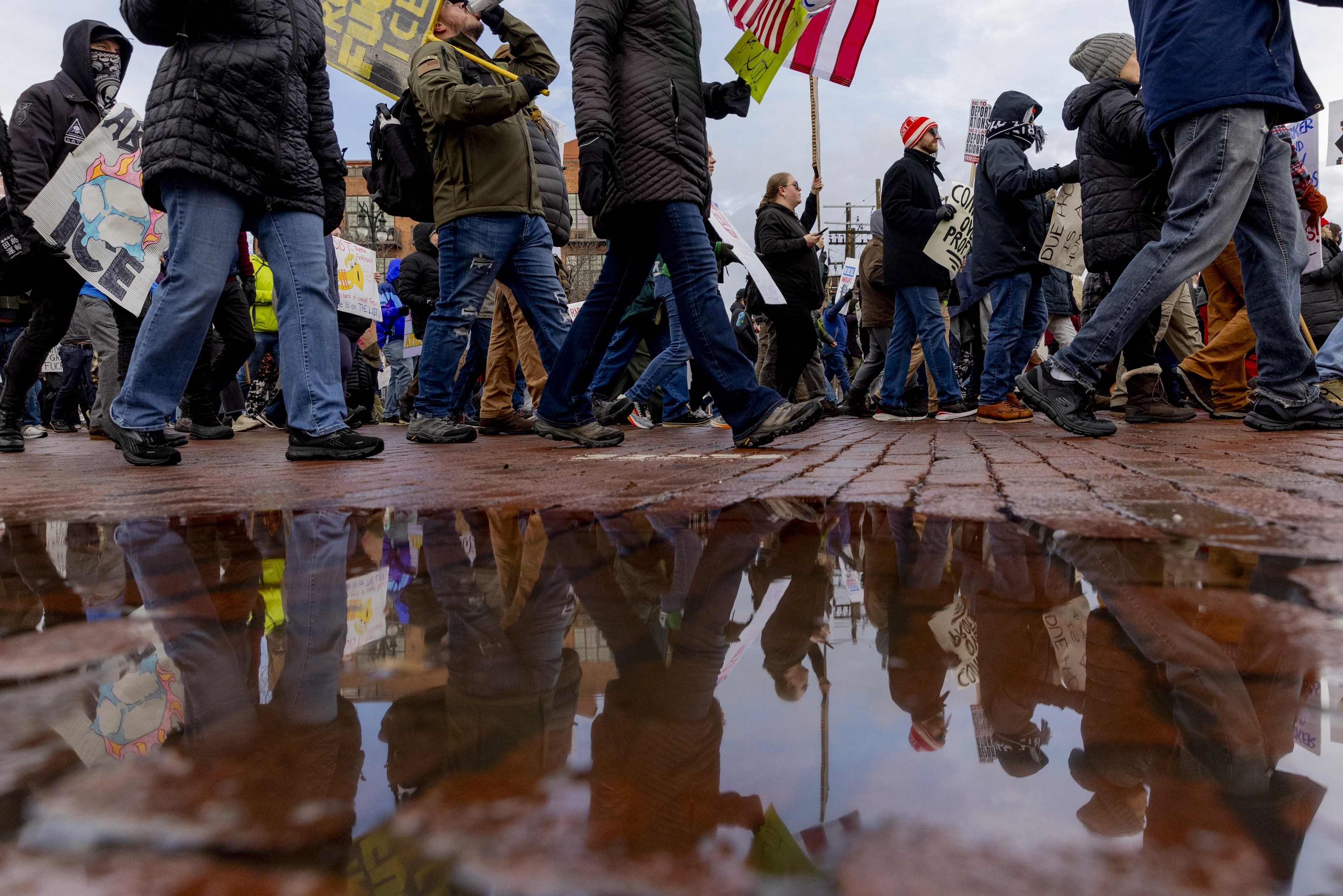 Protesters clash with police, Trump supporters in march in Detroit ...
