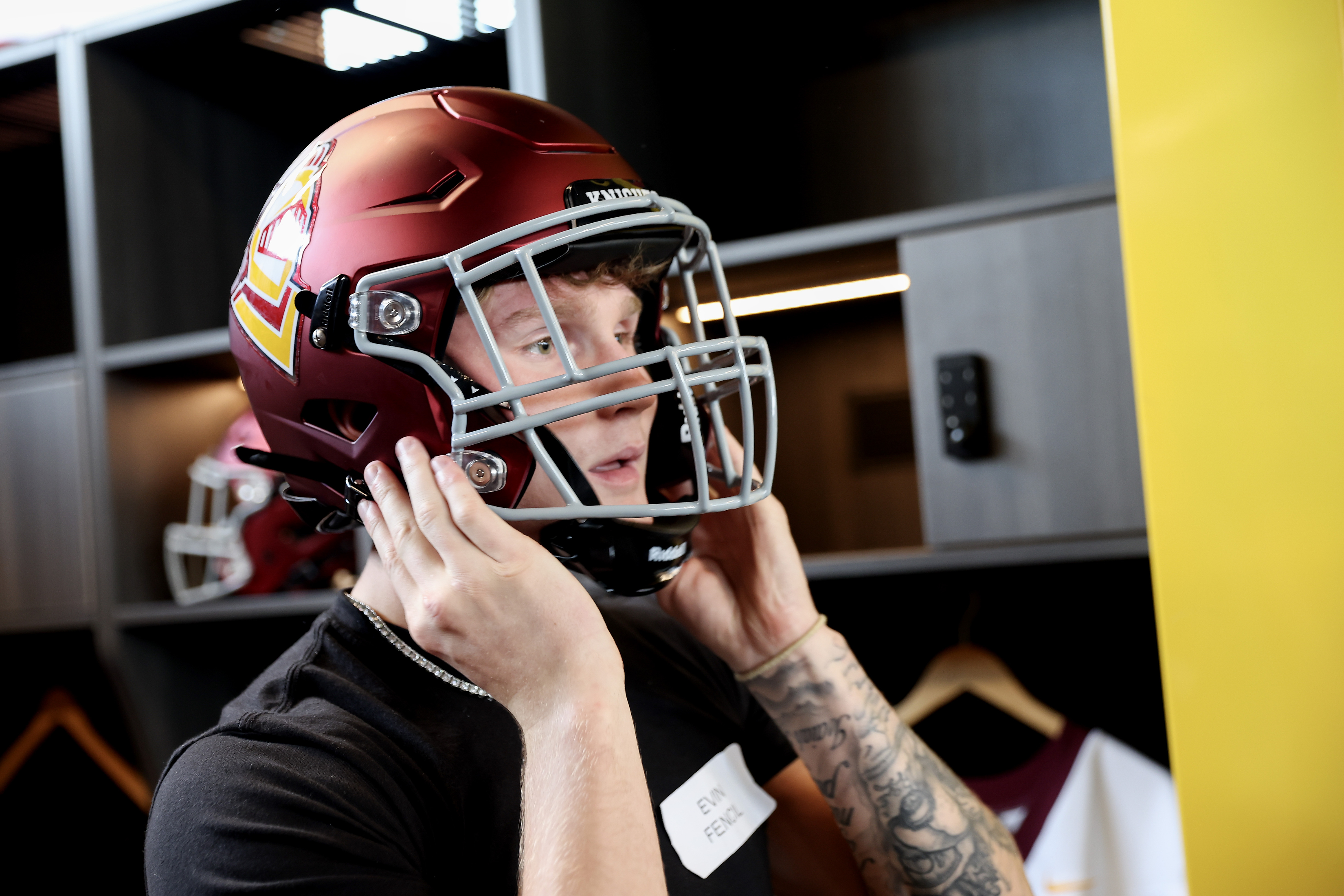 Calvin football players see their newly built locker room for the first ...