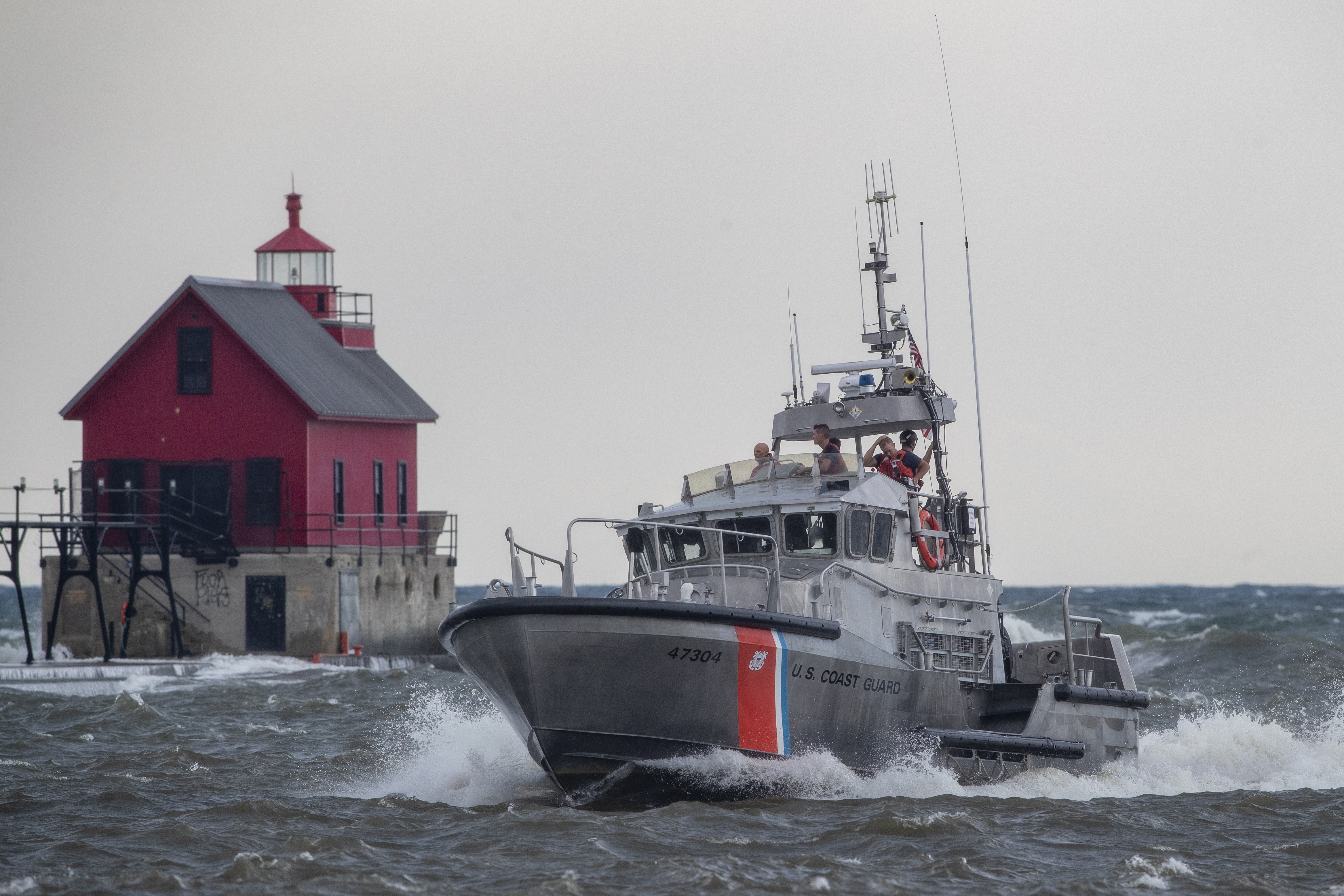 U.S. Coast Guard and surfers take advantage of Lake Michigan waves ...