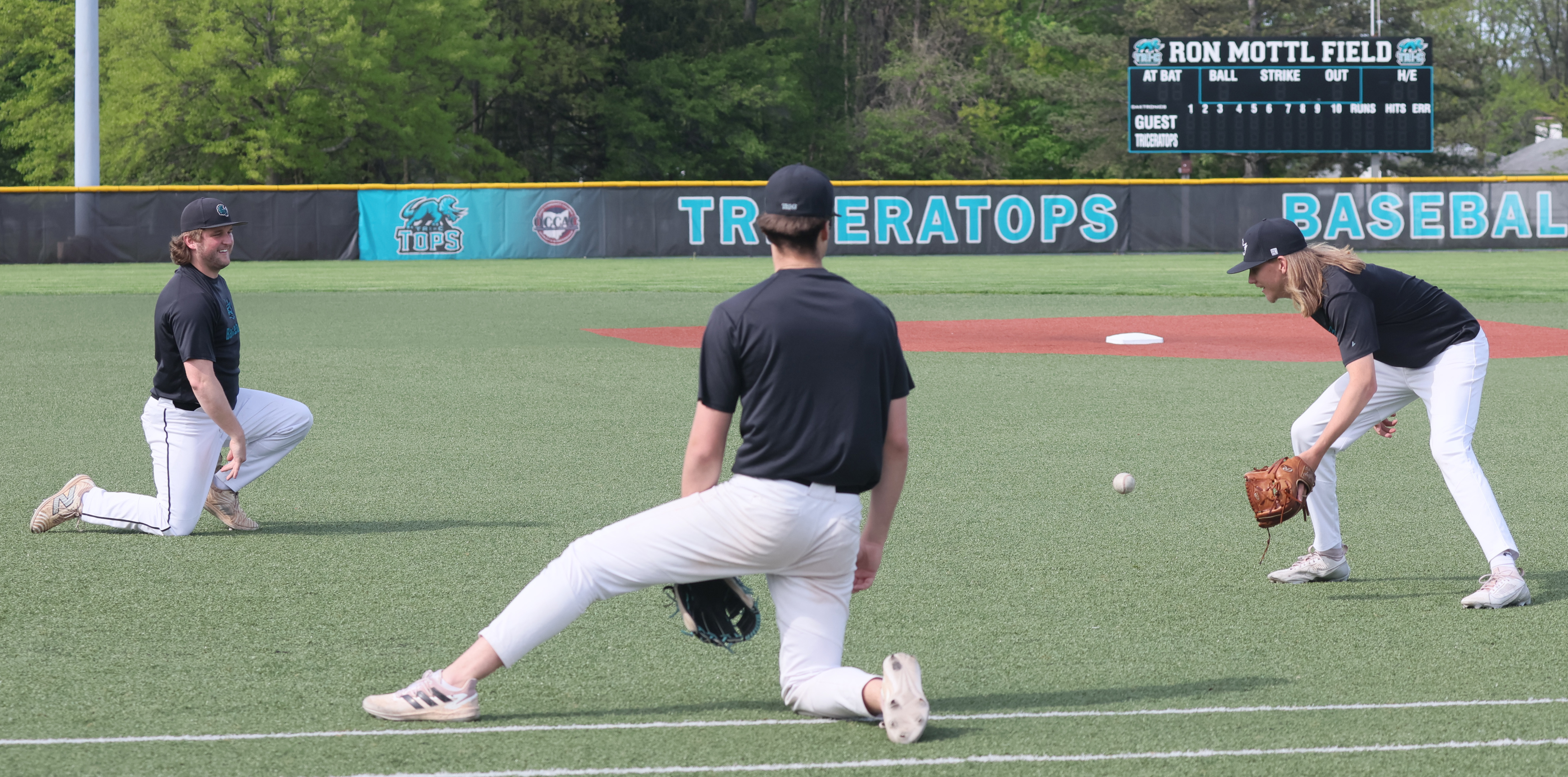 The Tri-C Triceratops baseball team practices before the start of their ...