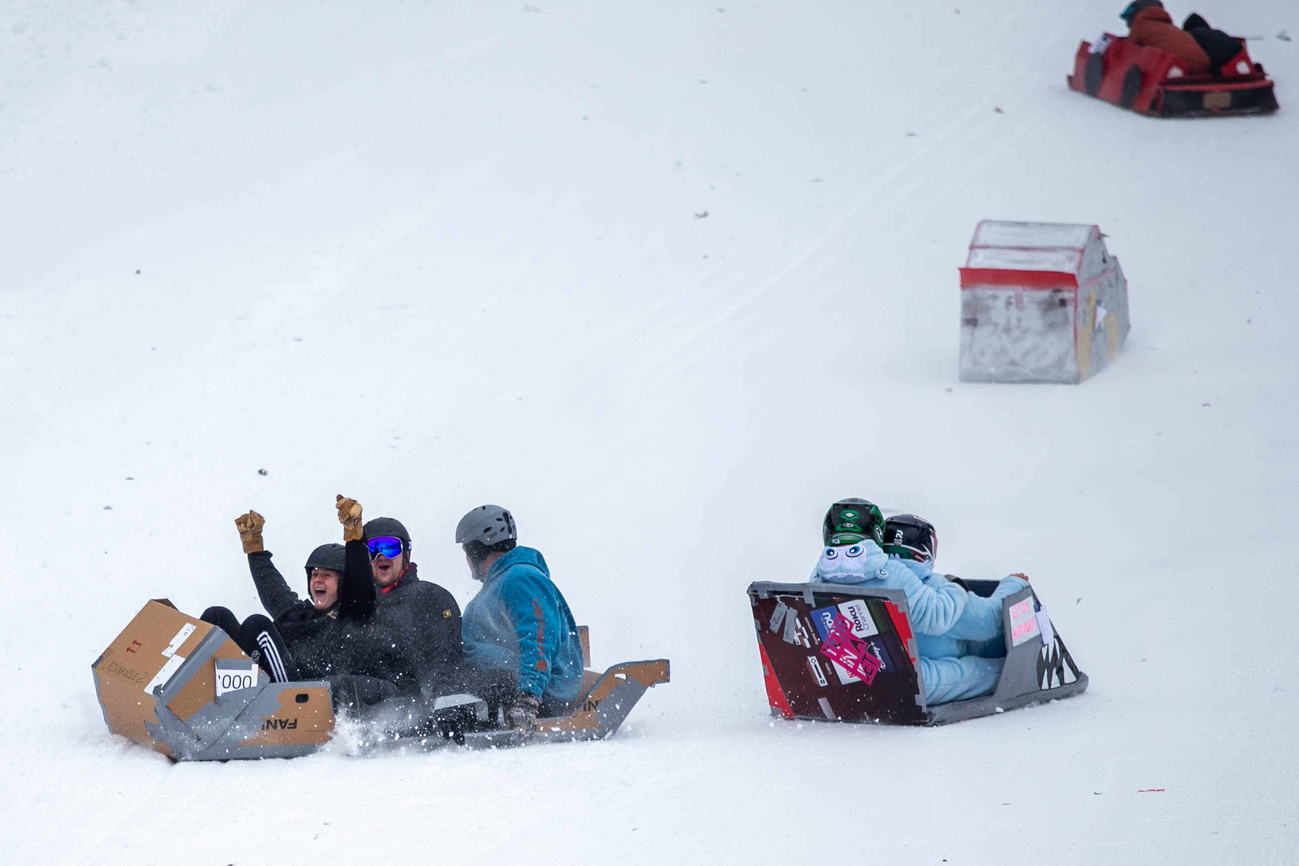 Photos: Cardboard sled teams battle for first place at Winterfest races ...