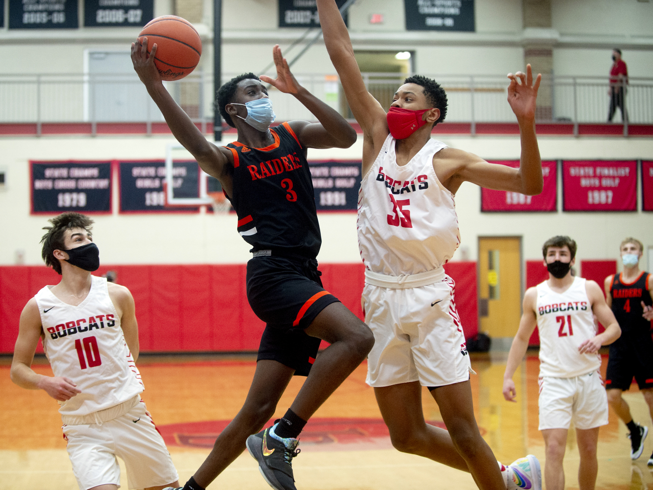 Grand Blanc defeats Flushing in Division 1 boys basketball regional ...
