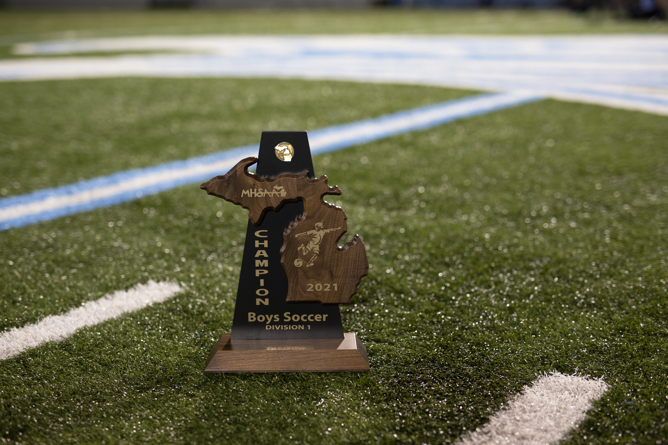 Pioneer soccer players receive medals and championship trophy - mlive.com