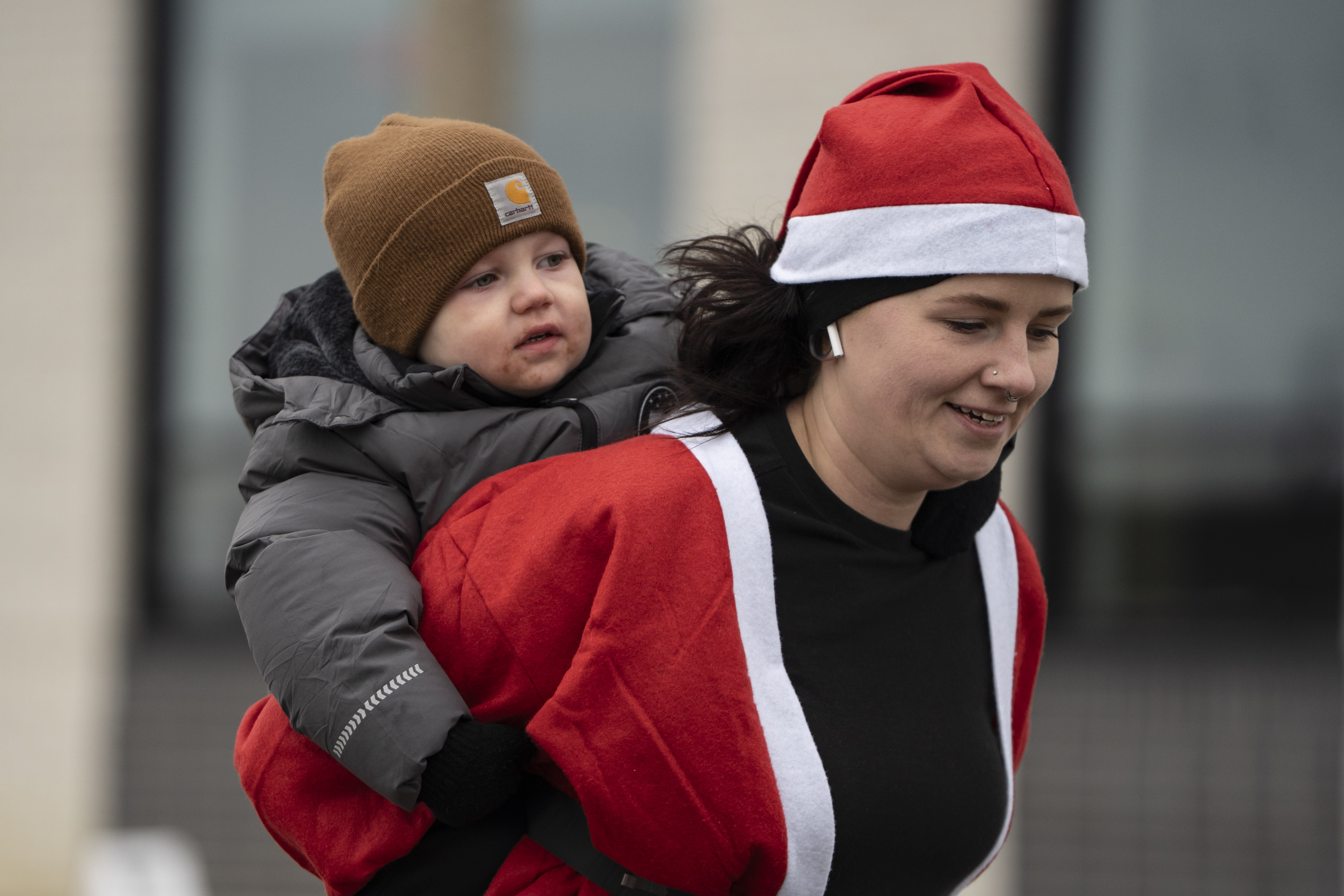 Hundreds put on their red suits for the YMCA Santa Run - mlive.com