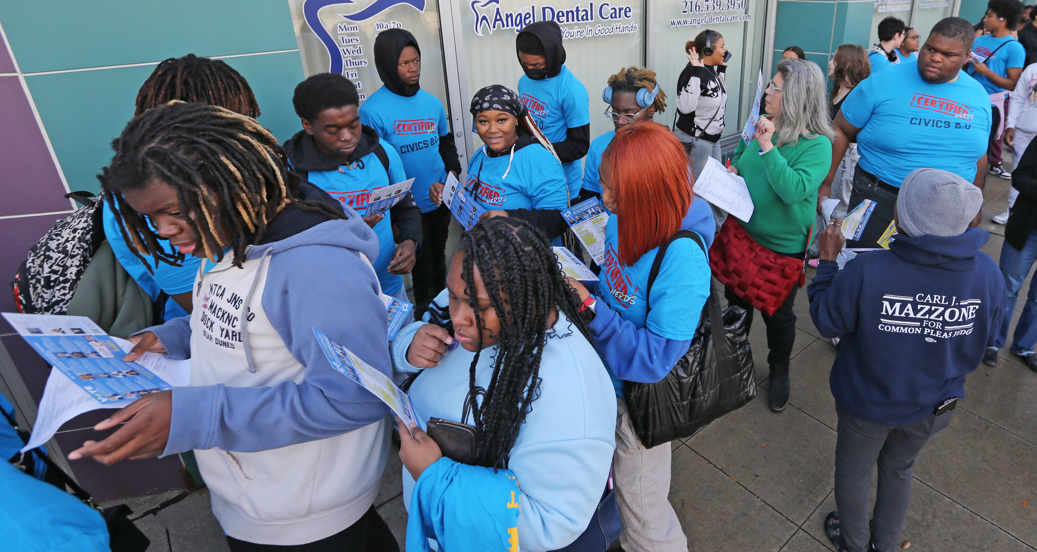 Newly eligible 18-year-old voters cast their first vote at the Cuyahoga ...
