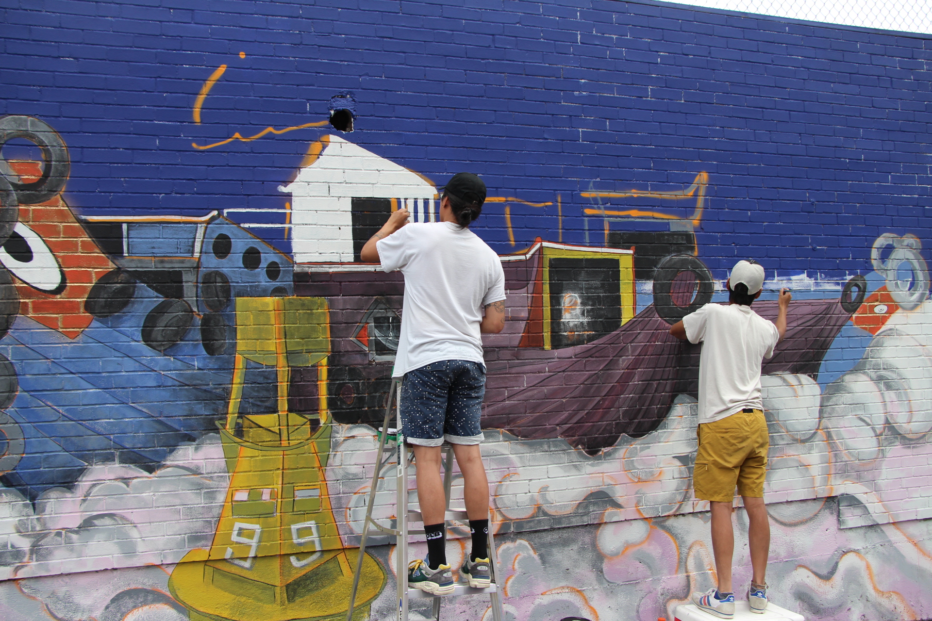 Murals from POW WOW Worcester 2021 encourage children to reach for ...