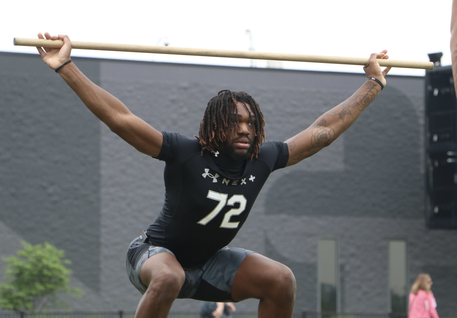 Imhotep Charter defensive end Zahir Mathis runs through drills during ...