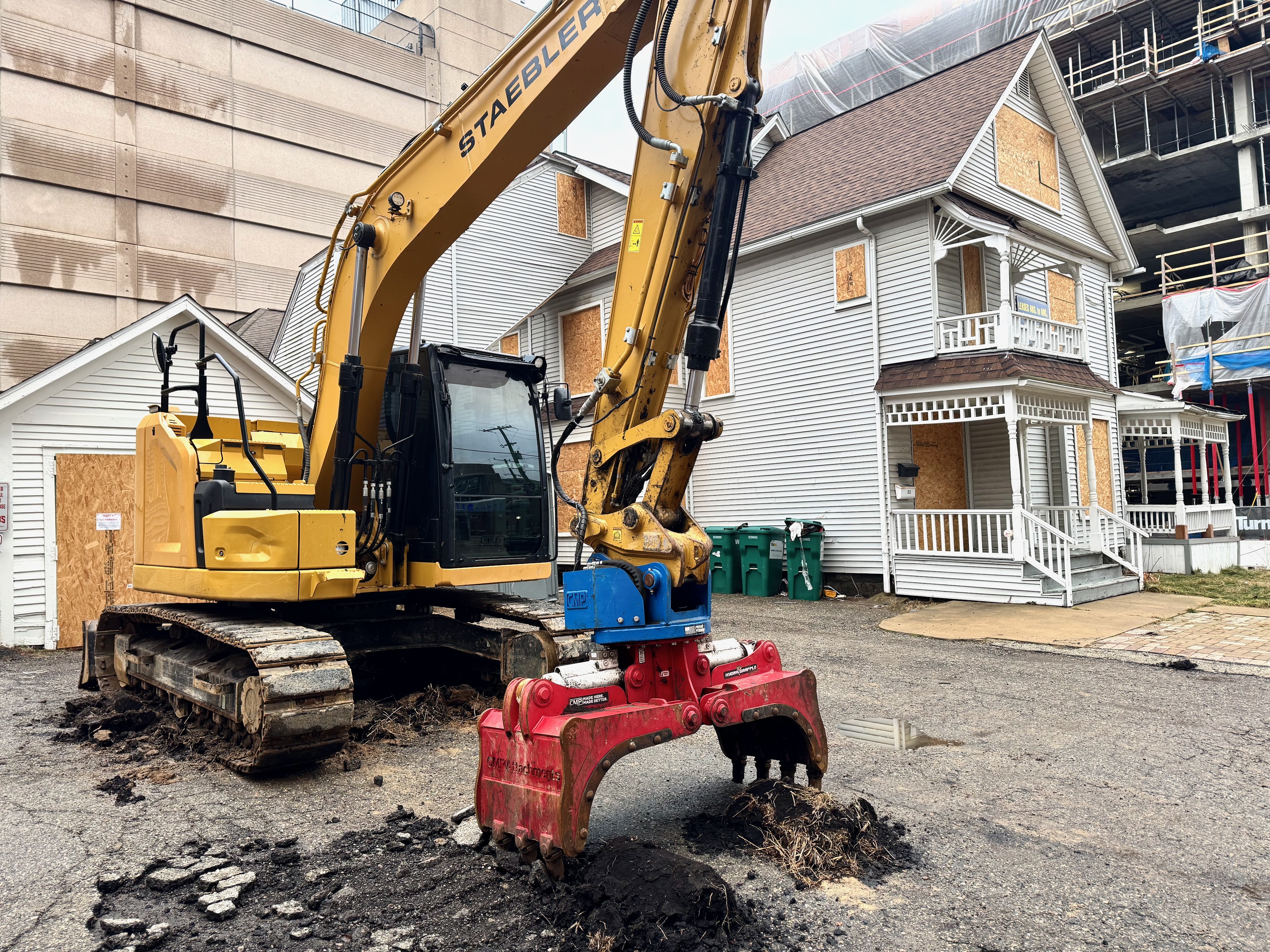 Structures awaiting demolition for 19-story high-rise development in ...