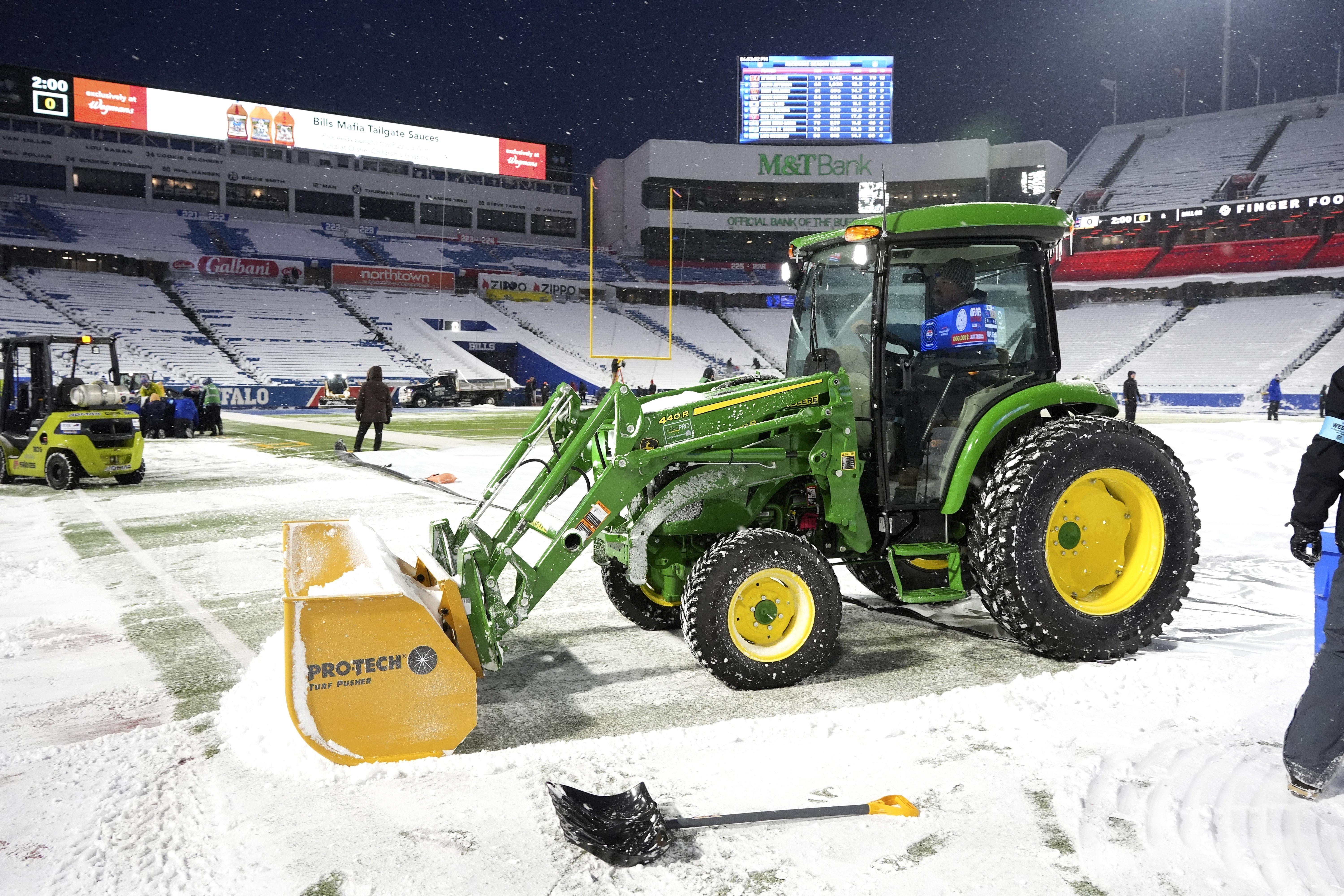 Crews clear out snow before Buffalo Bills take on San Francisco 49ers ...