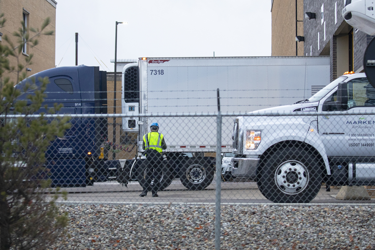 Trucks carrying COVID-19 vaccine depart Pfizer plant in Portage ...