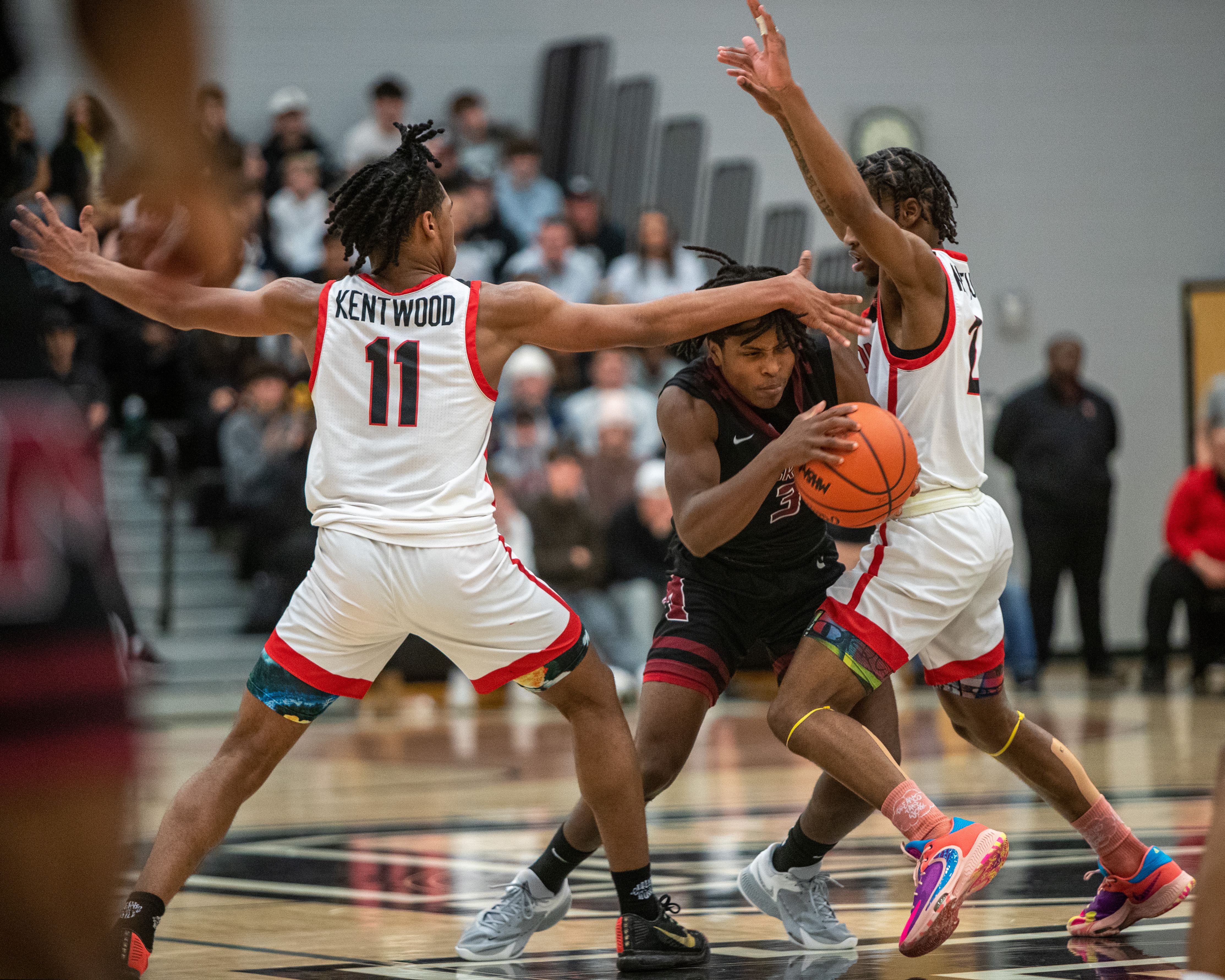 Muskegon defeats East Kentwood 68-48 in boys basketball regional ...