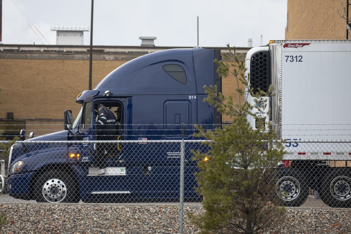 Trucks carrying COVID-19 vaccine depart Pfizer plant in Portage ...