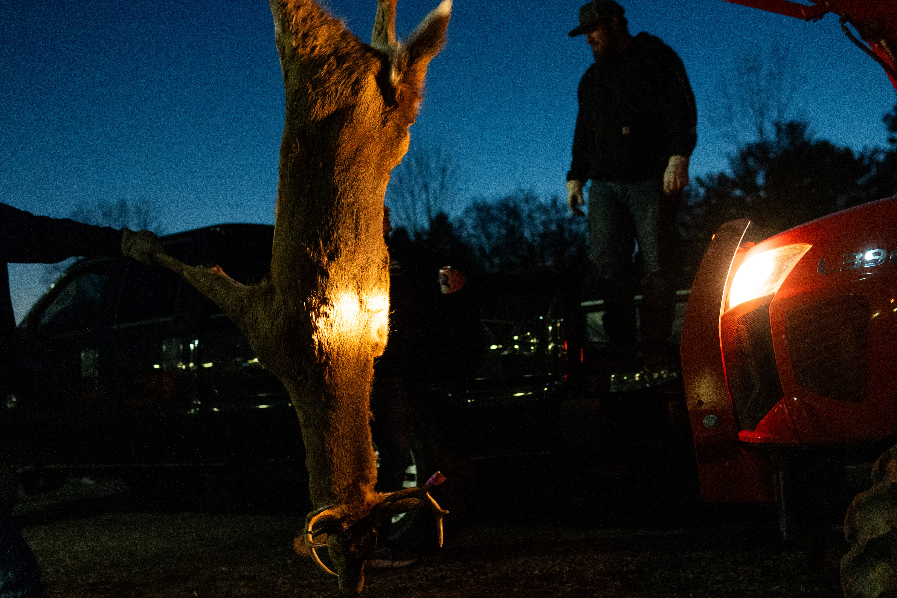 Hunters make their way to the buck poles on opening day - mlive.com