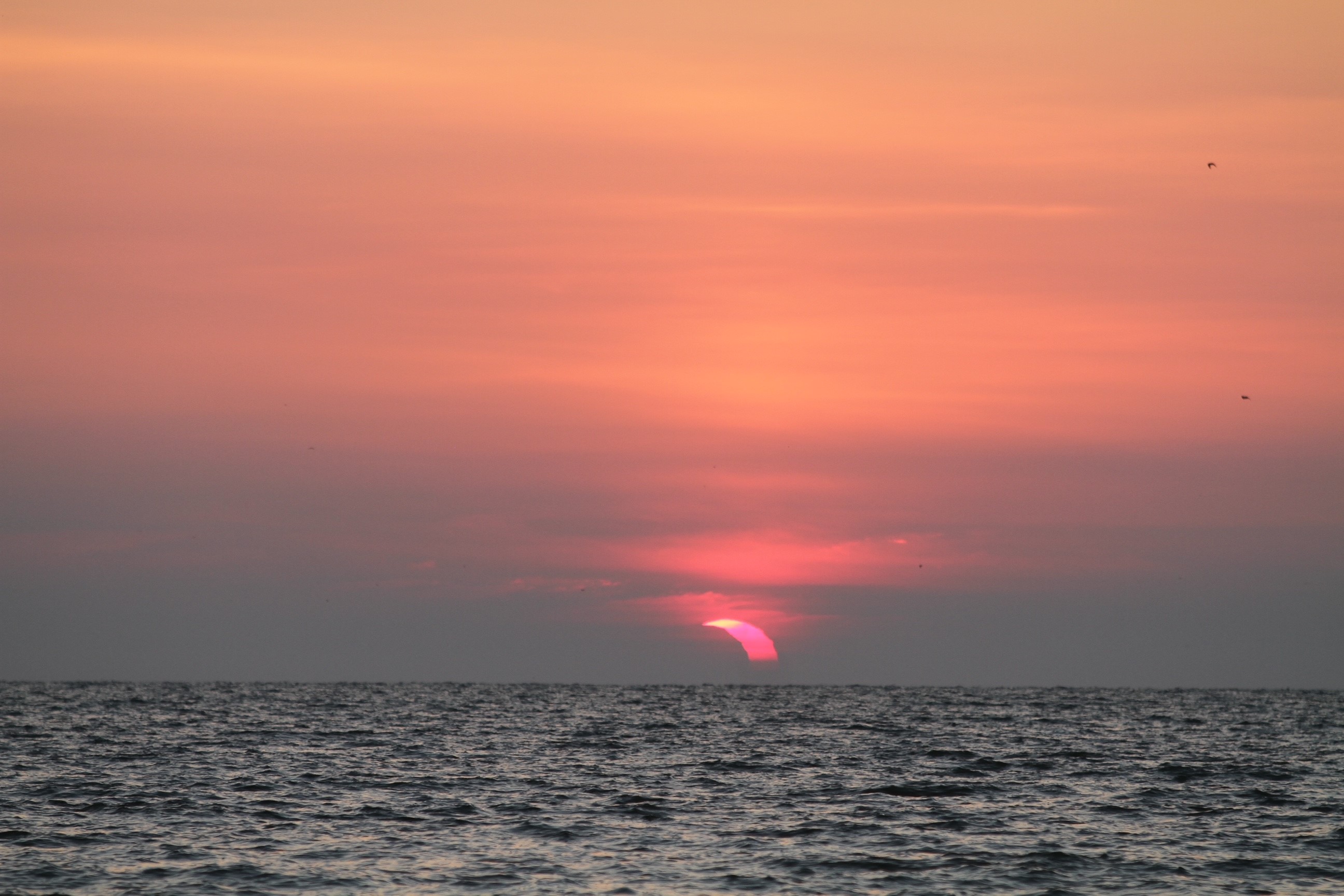 Sunrise solar eclipse over Lake Huron - mlive.com