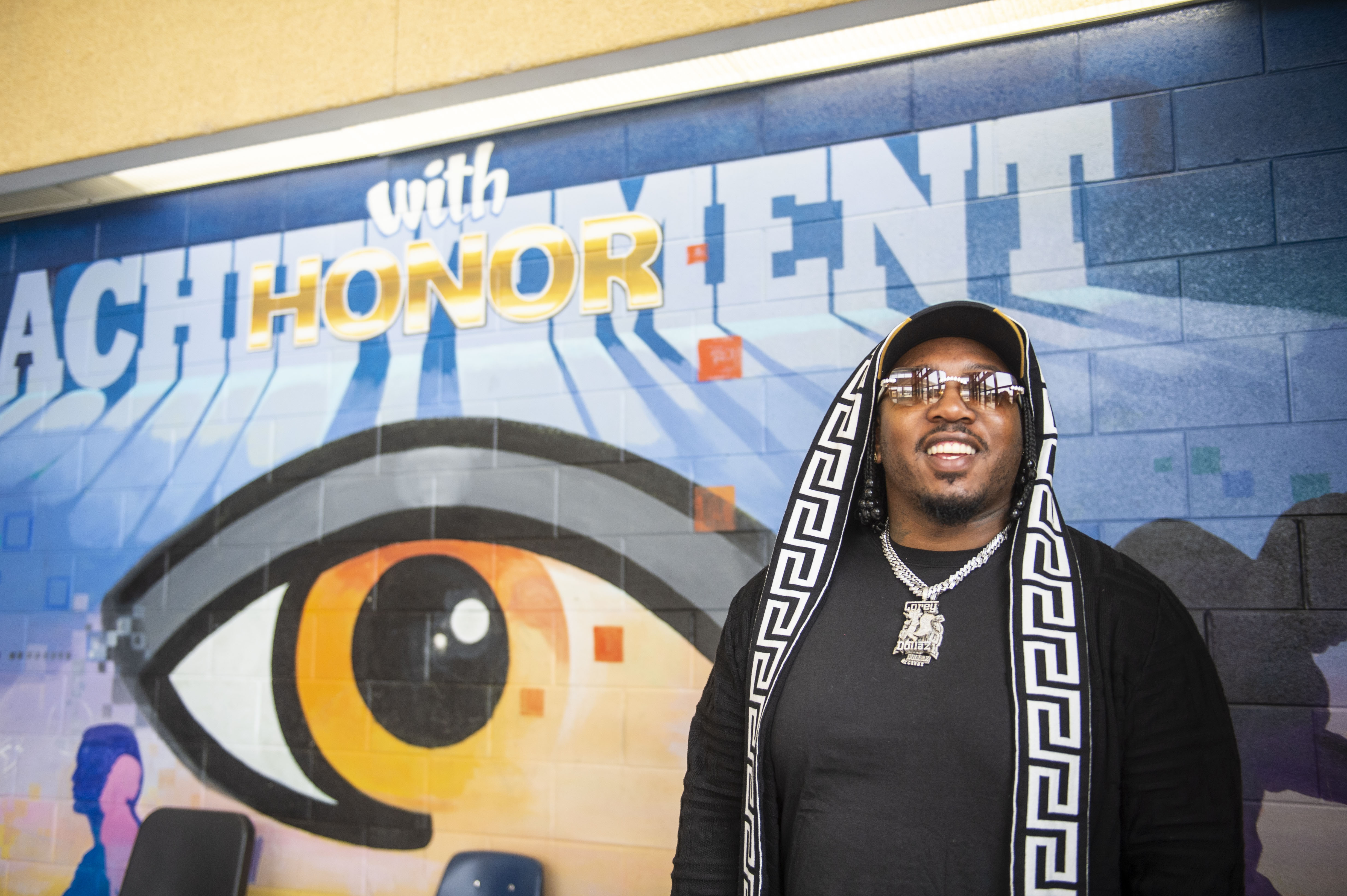 Rapper Corey "Corey Dollaz" Davis gives back to Arthur Hill High School ...